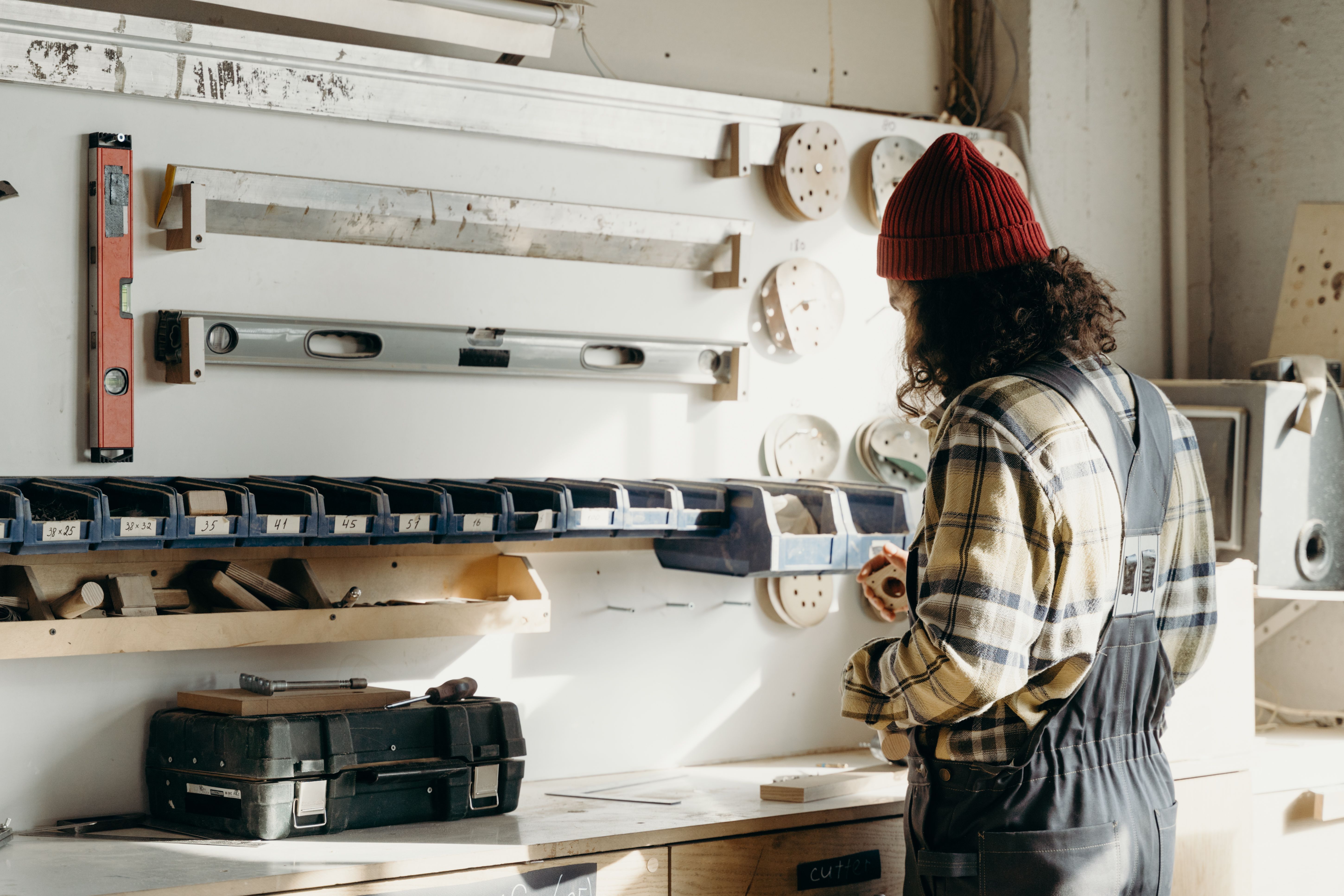 Photo of a Carpenter Wearing a Leather Apron · Free Stock Photo