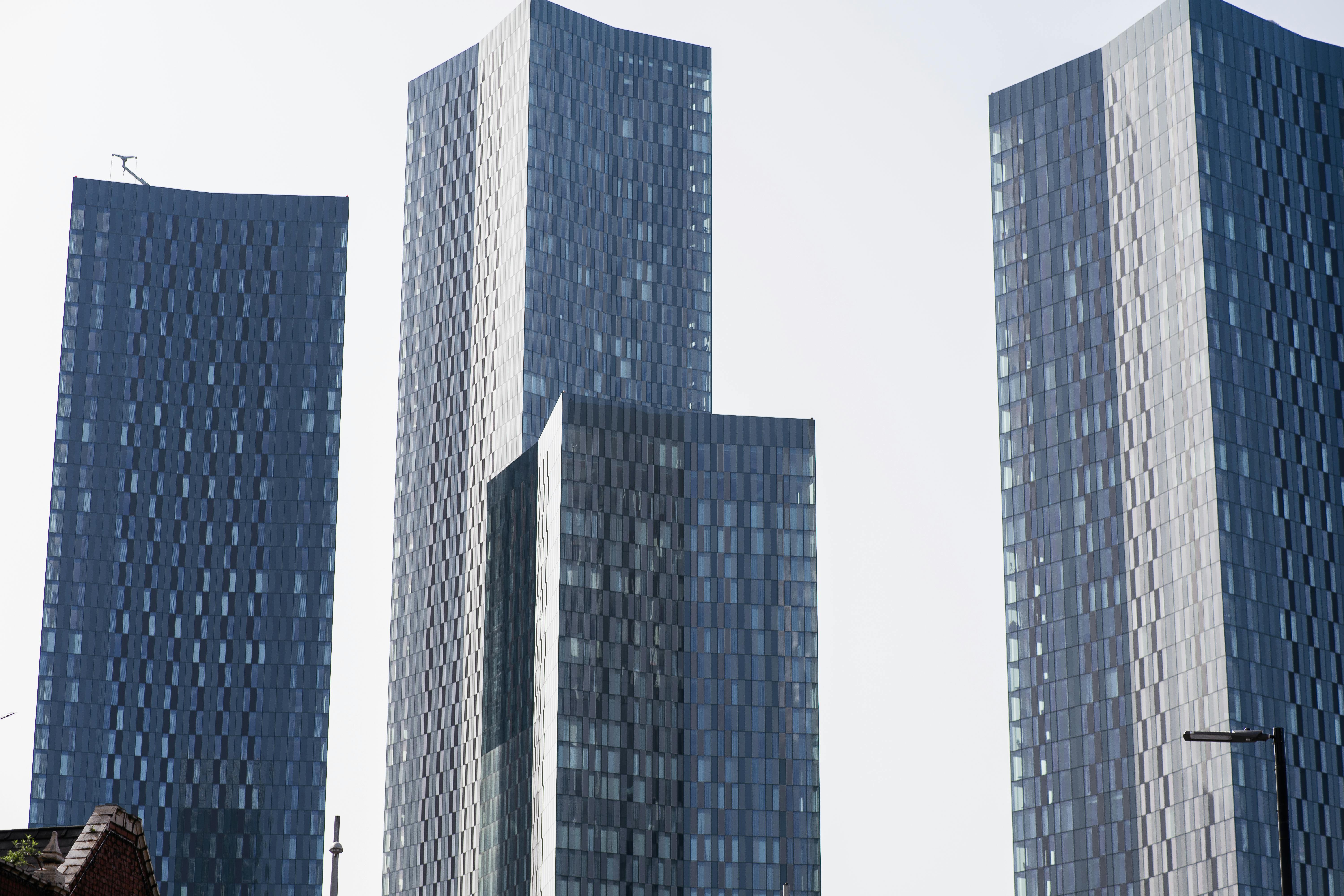 Gray Concrete Buildings Under the White Sky · Free Stock Photo