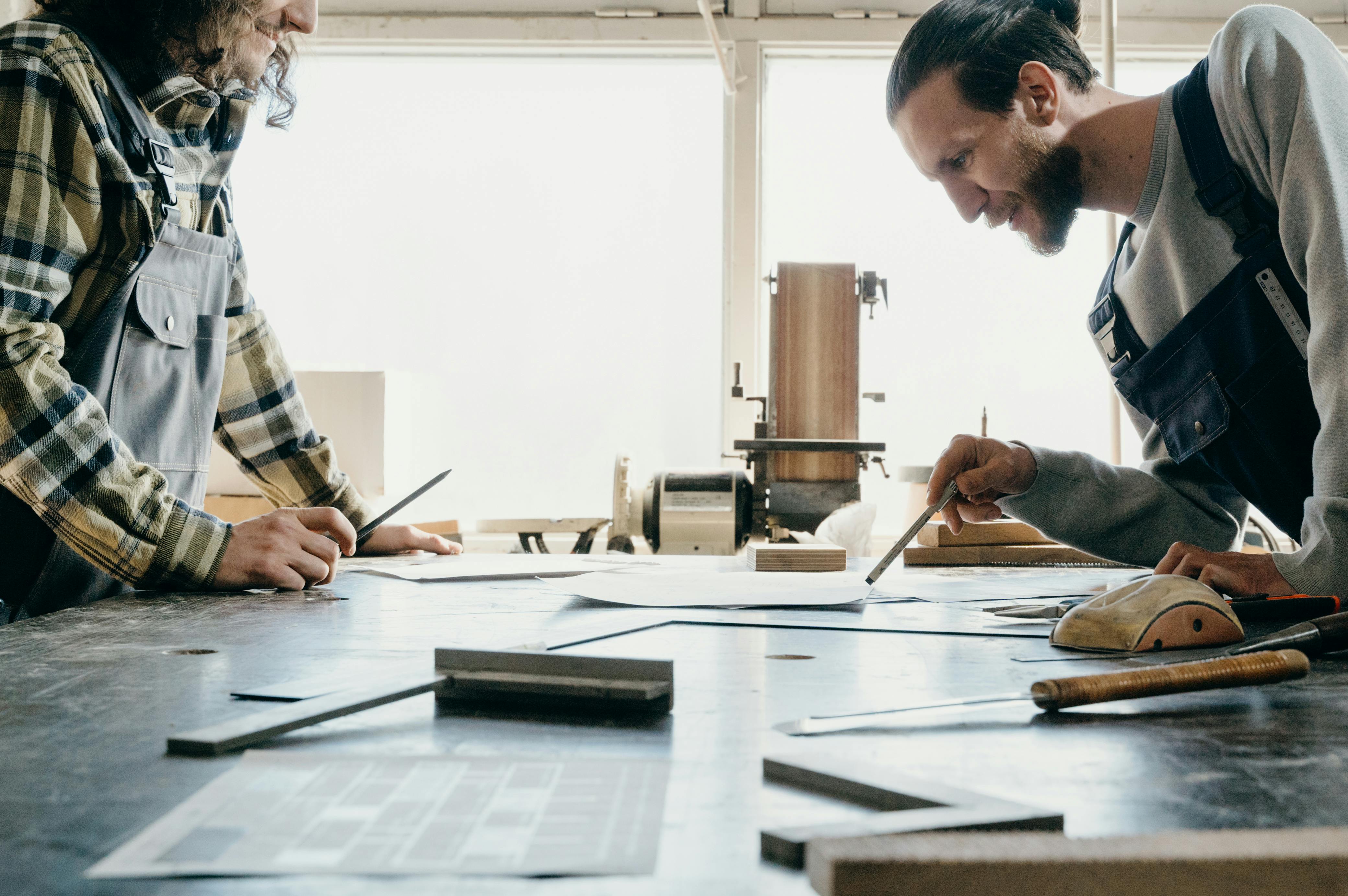 Men Standing at the Table · Free Stock Photo