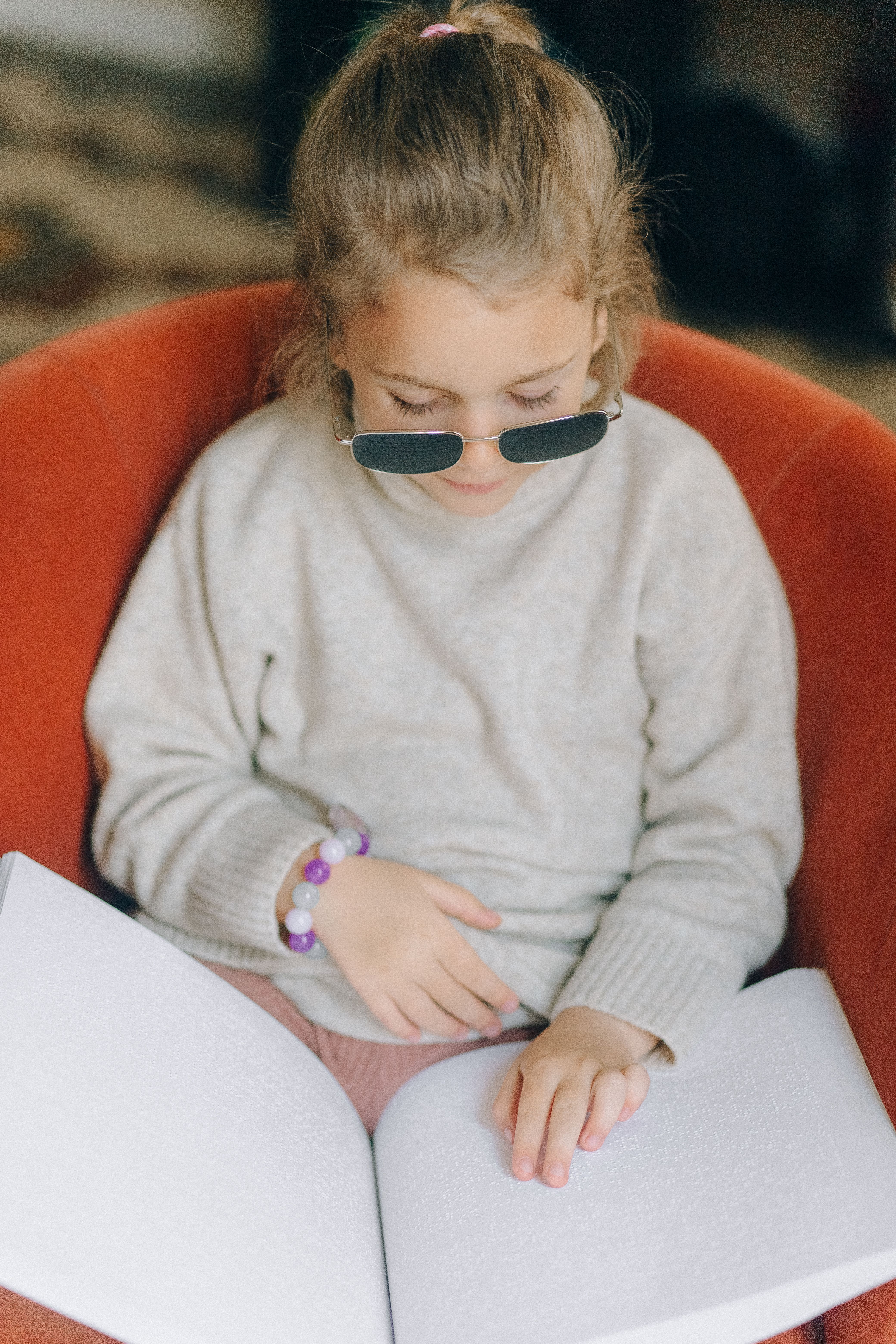 A Blind Girl Reading Braille Book · Free Stock Photo