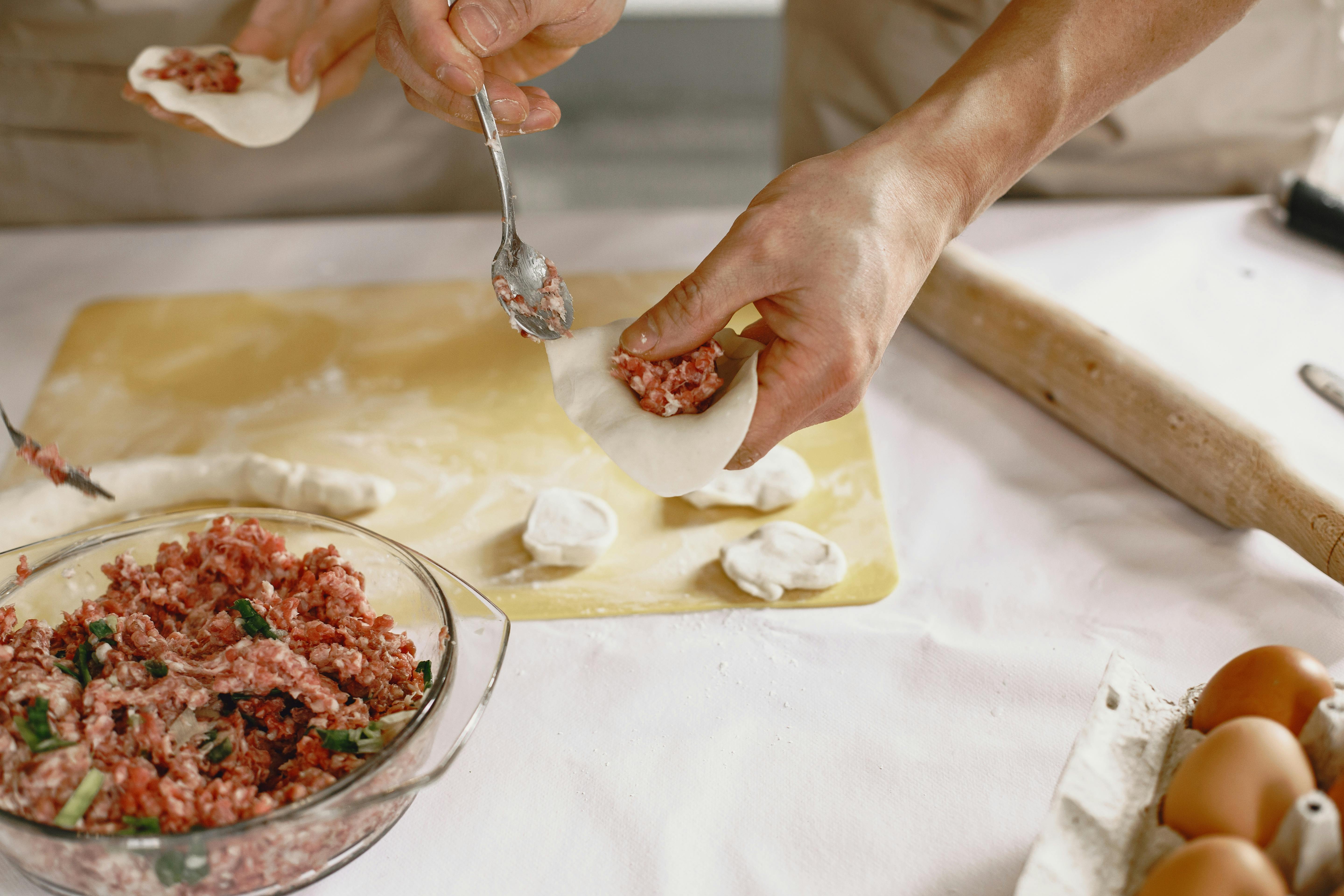 A Person Making a Dumpling · Free Stock Photo