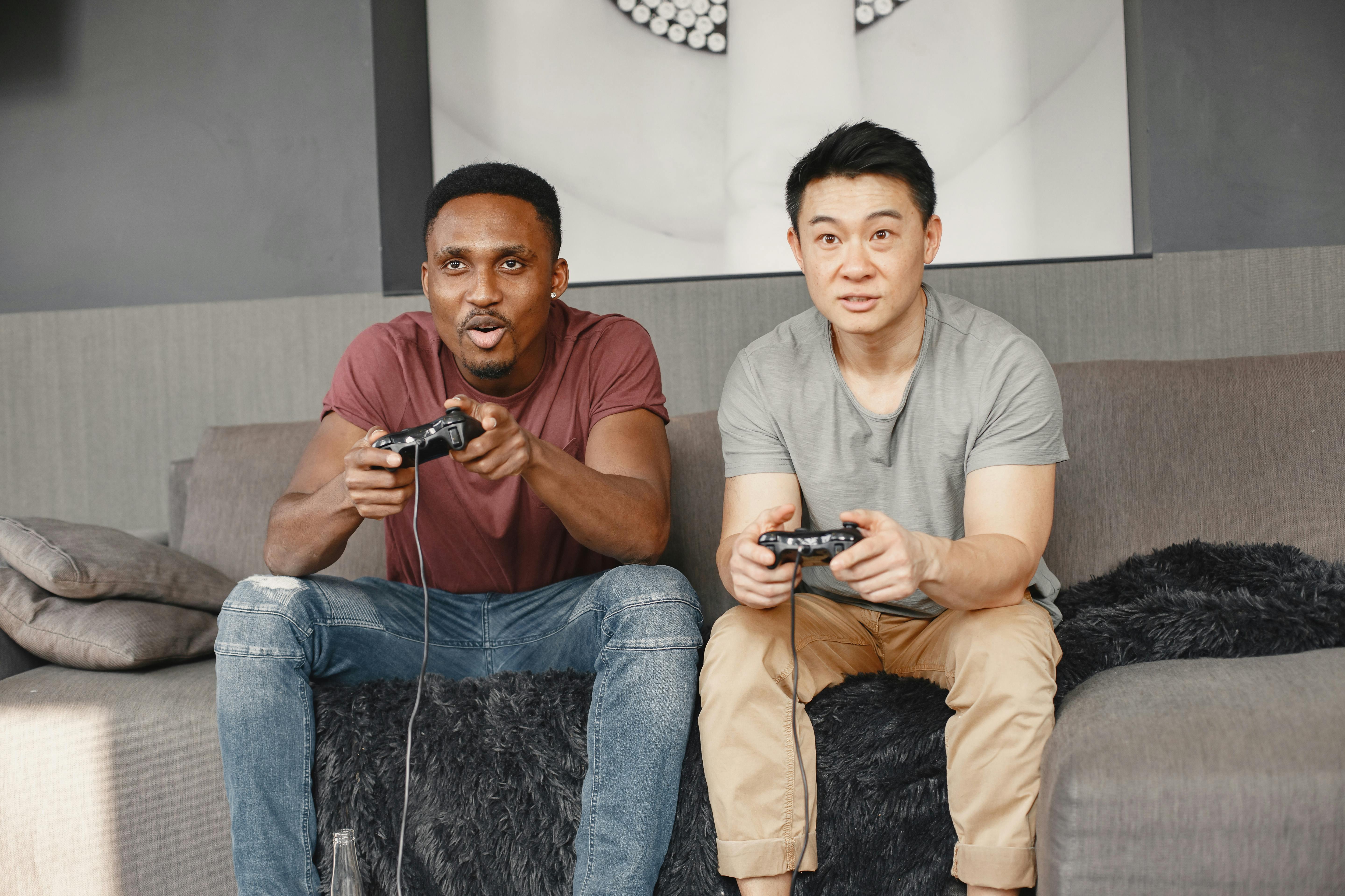 Two Men Playing Video Game · Free Stock Photo