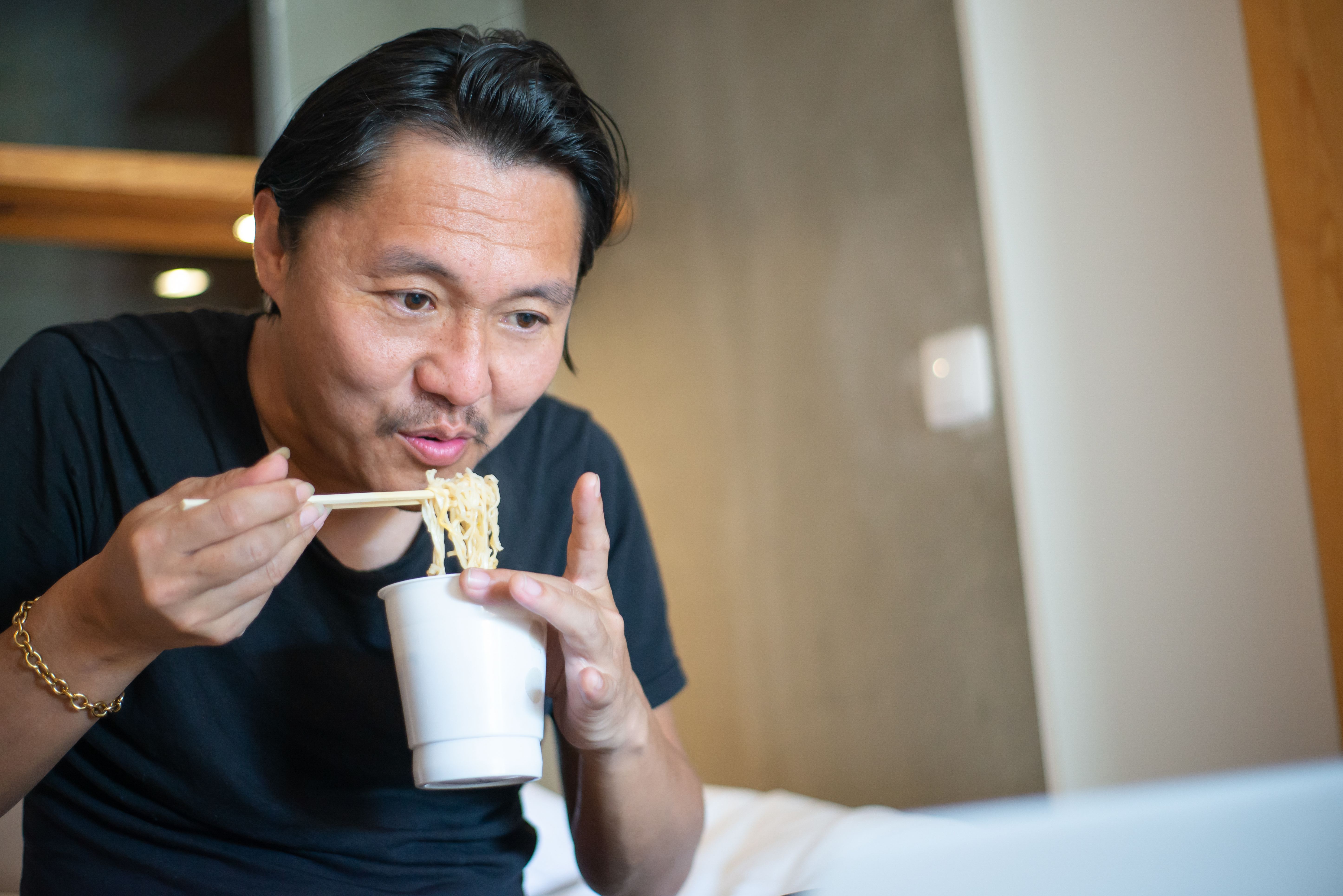 Man Eating Noodles Using Chopsticks · Free Stock Photo
