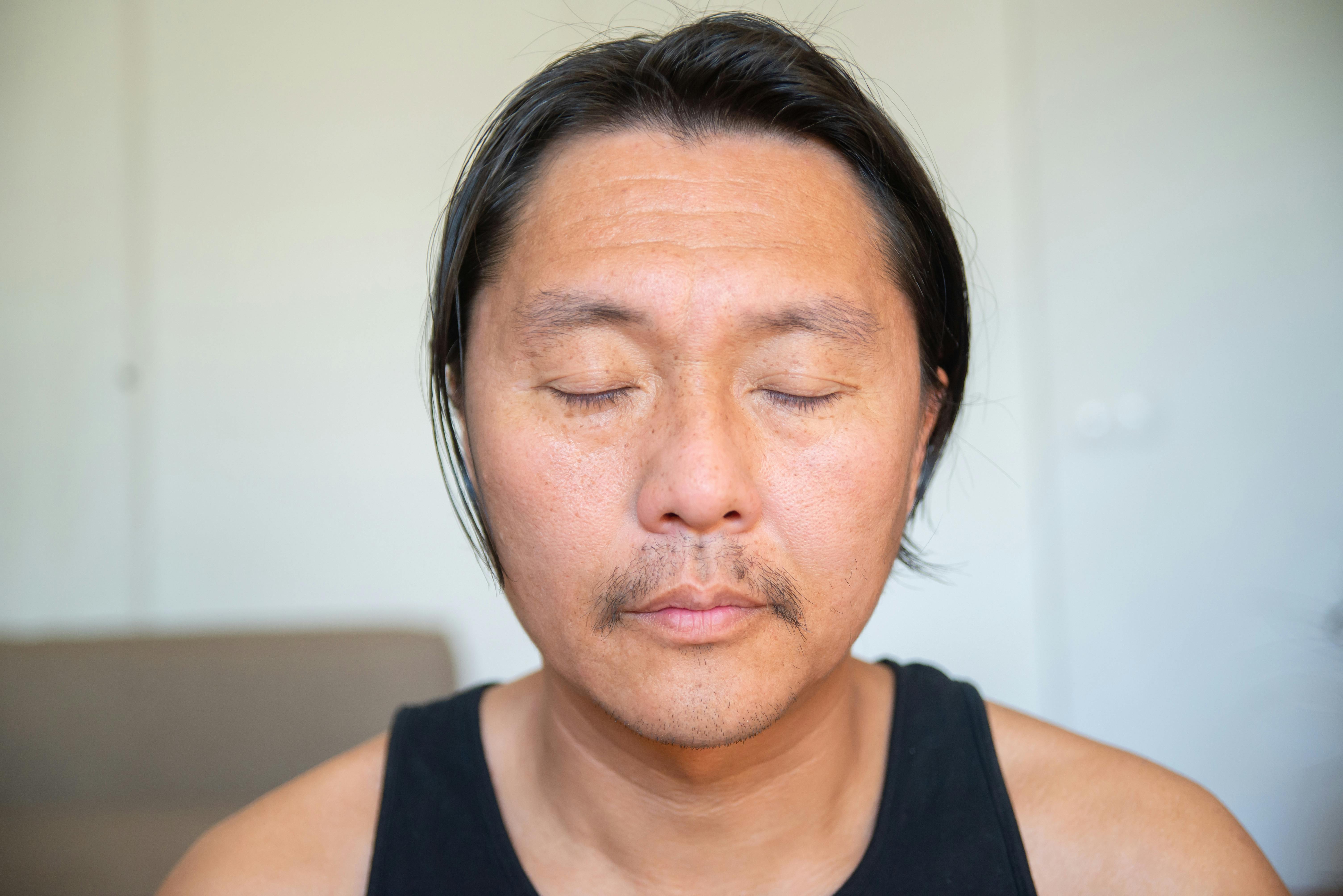 Close Up Photo of a Man Eyes Closed · Free Stock Photo