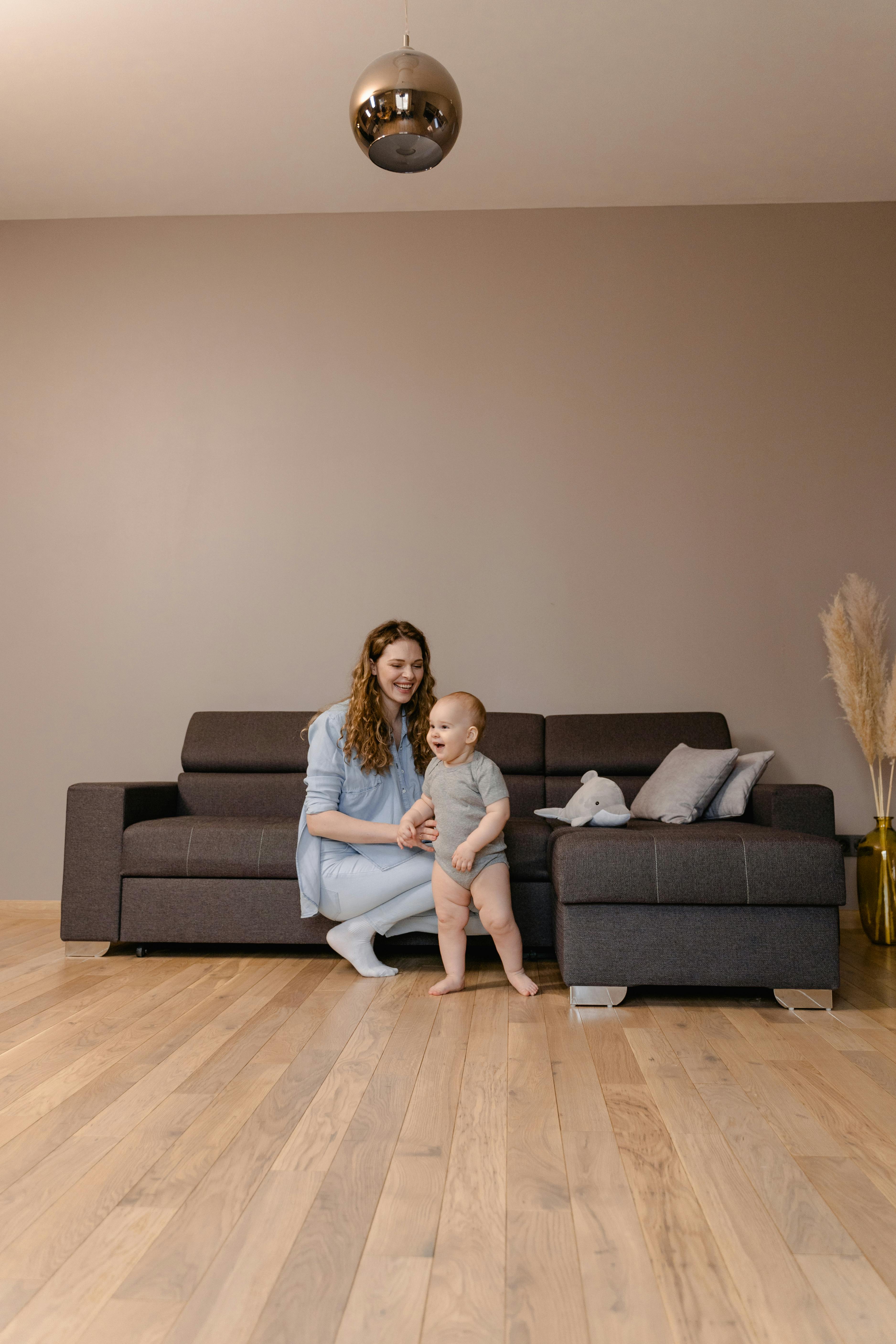 Mother Guiding her Baby · Free Stock Photo