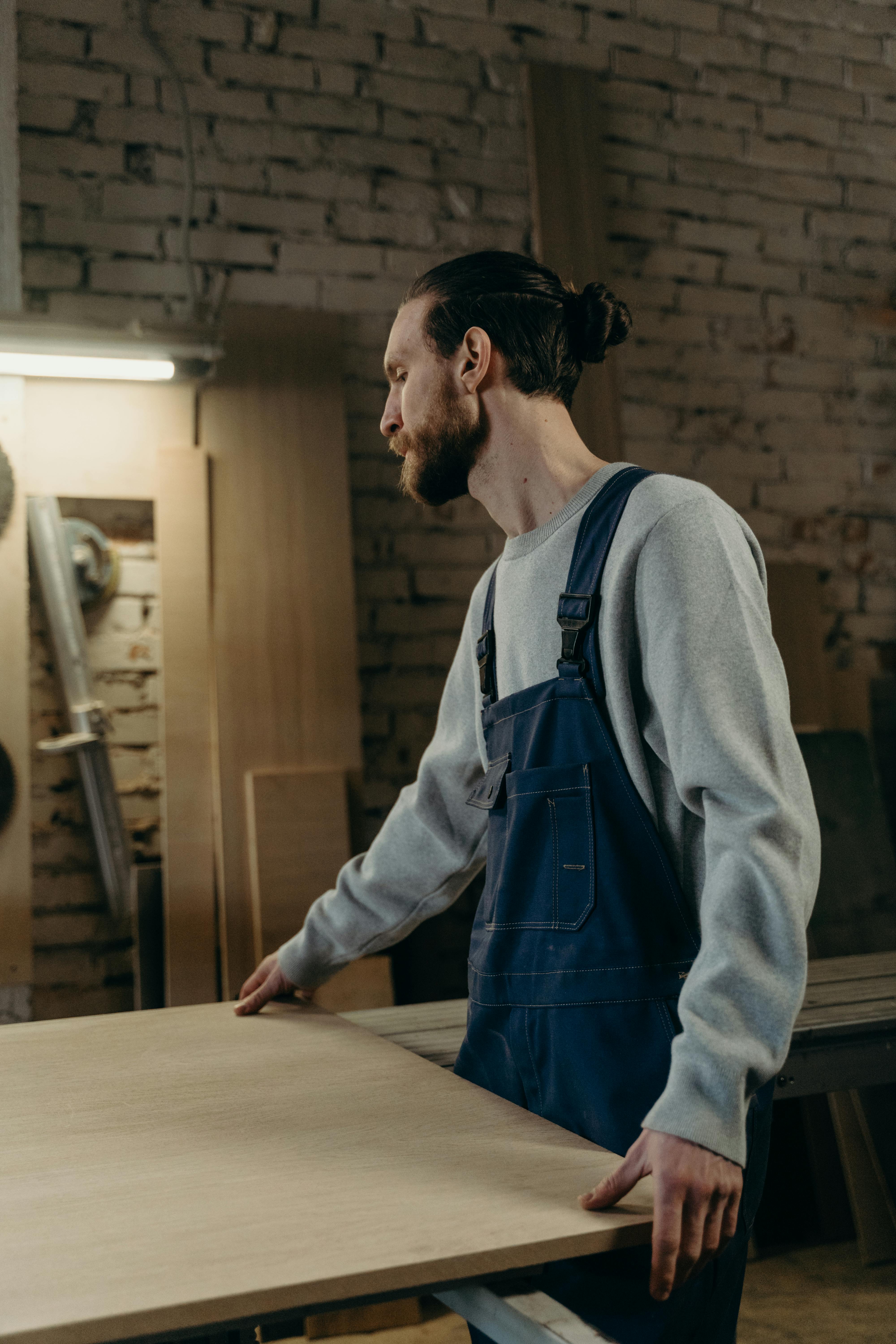 Carpenter Holding Panels · Free Stock Photo