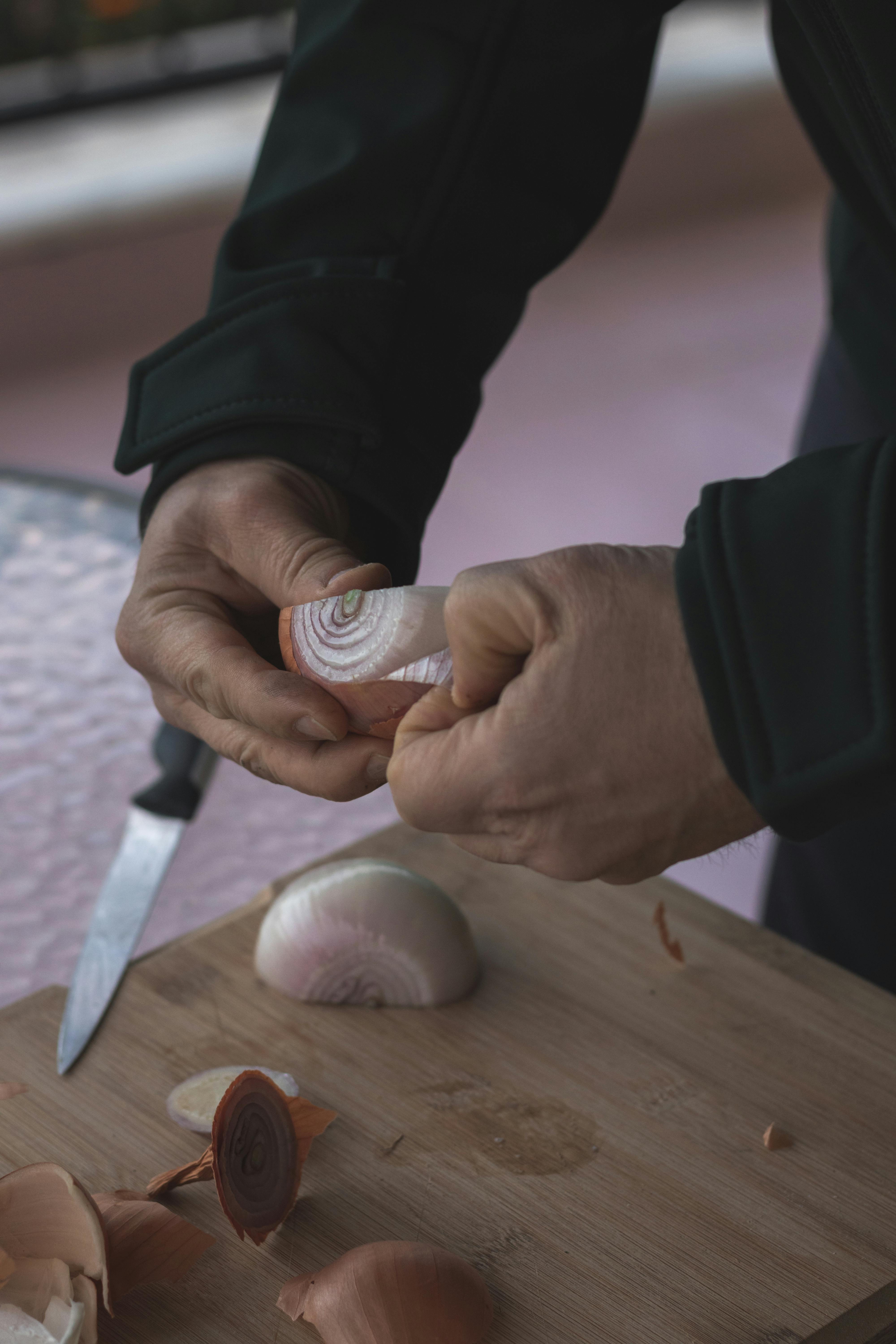 Person Holding a Knife · Free Stock Photo