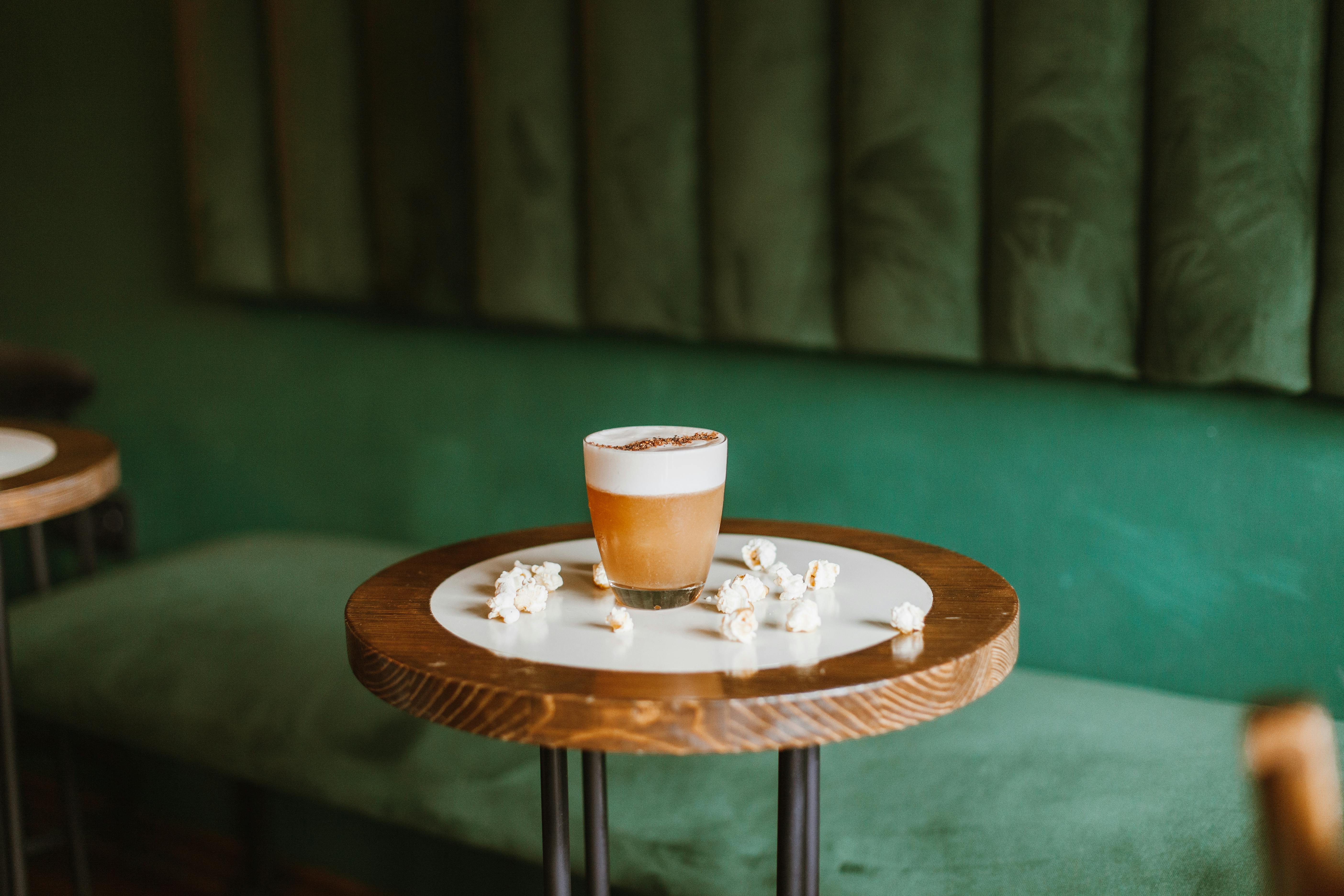 A Glass of Drink on a Round Table · Free Stock Photo