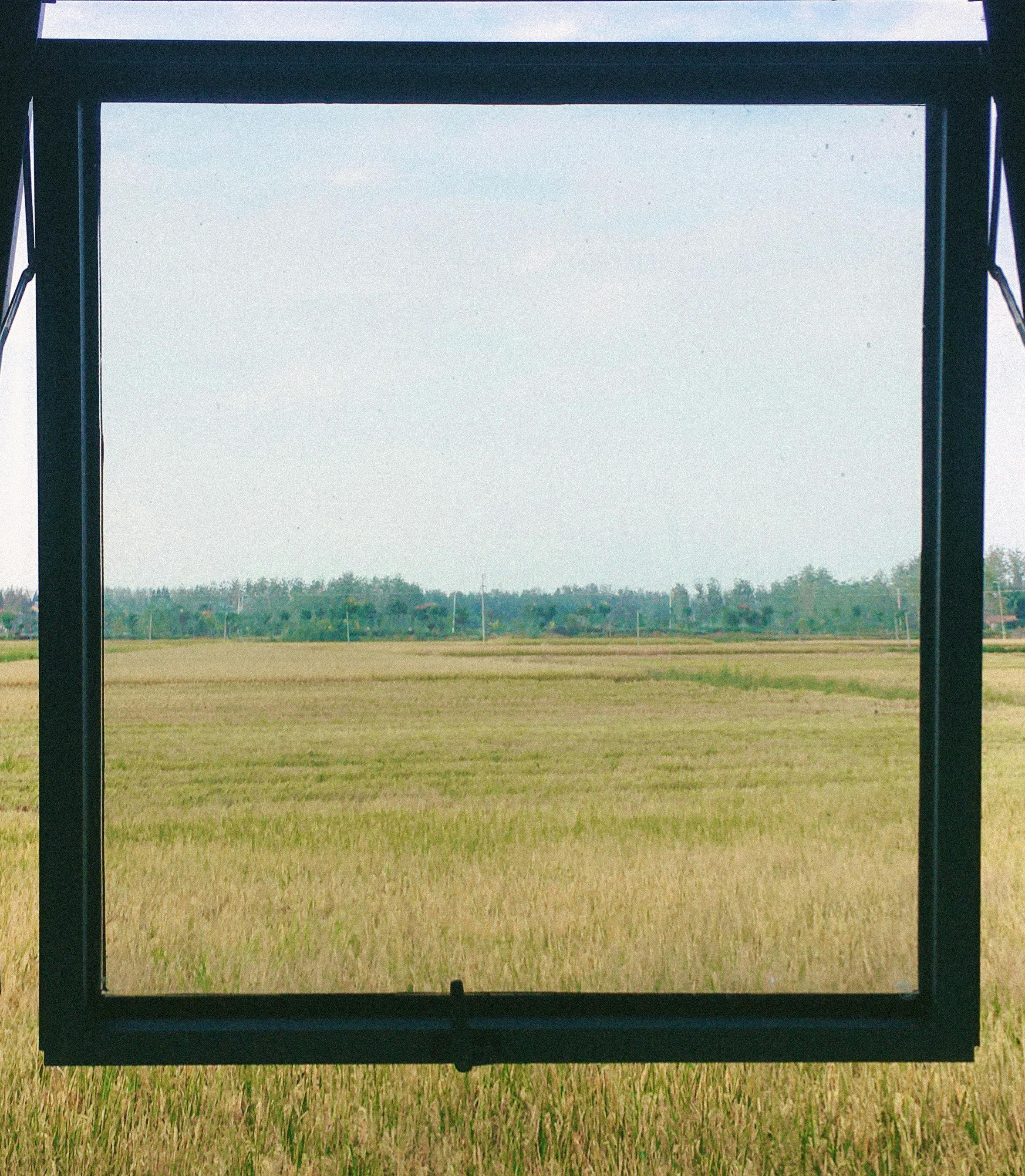 Window Frame over Grassland · Free Stock Photo