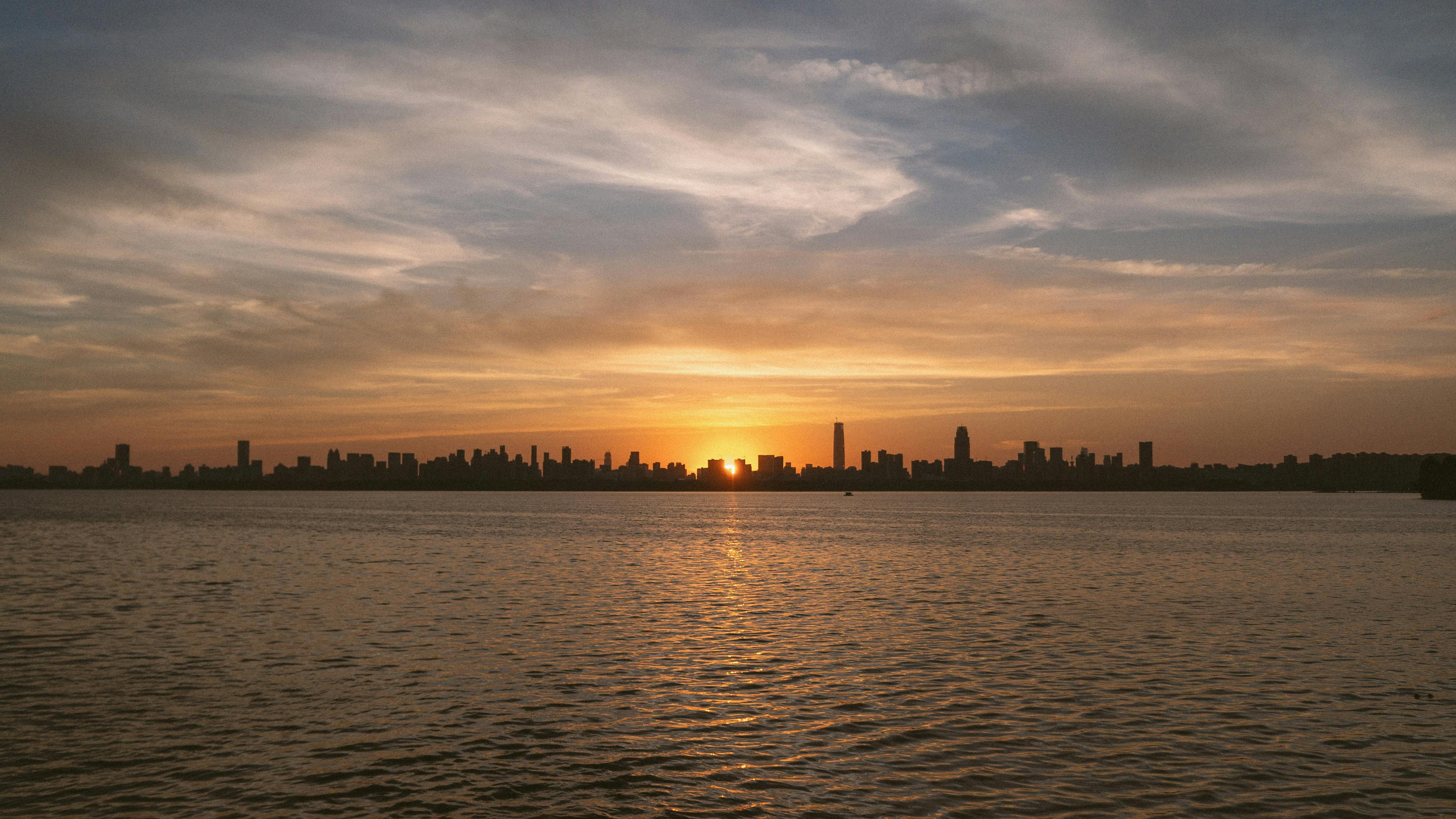 City Buildings During Sunset · Free Stock Photo