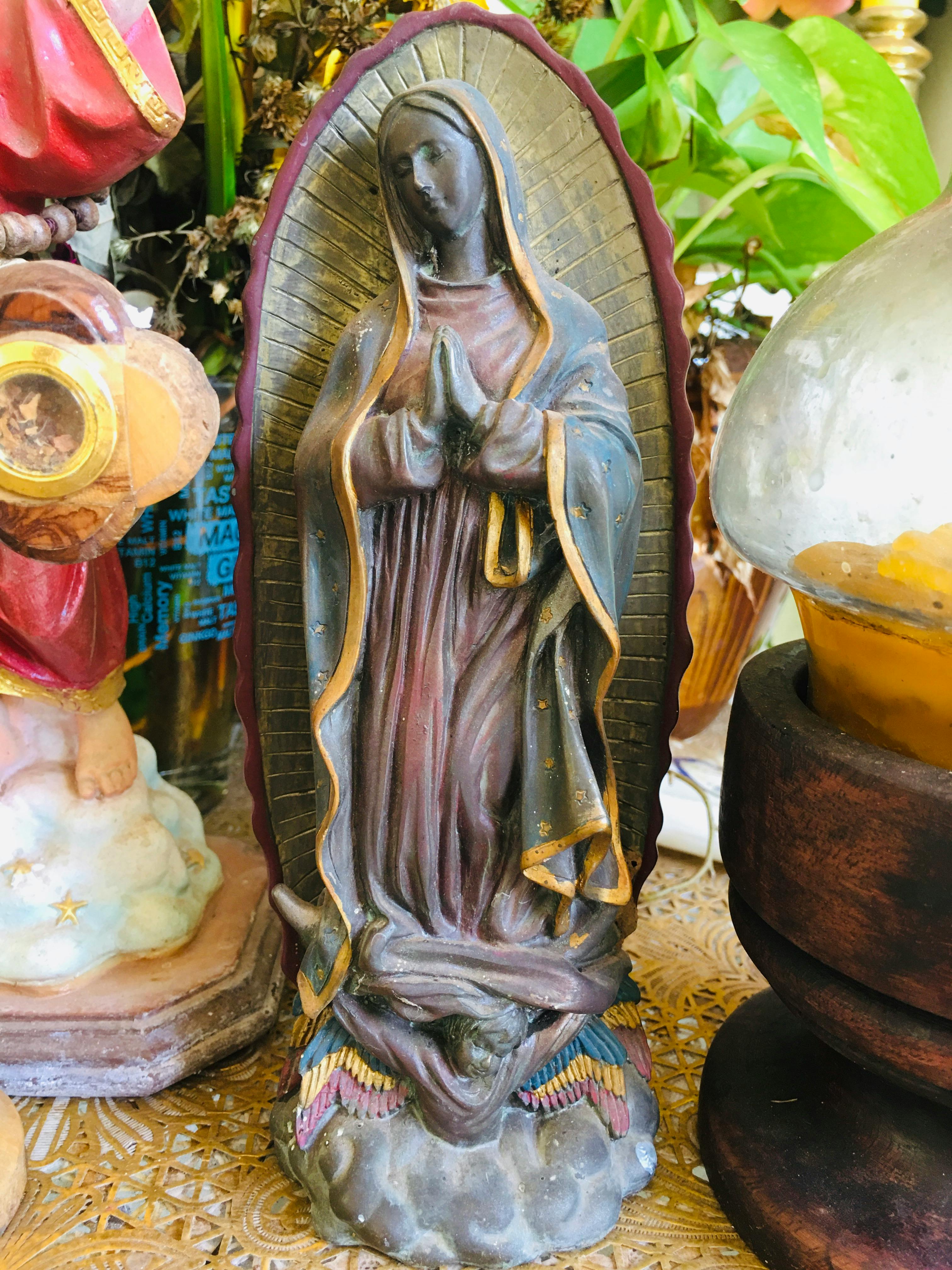 Variety Of Religious Statues On Altar · Free Stock Photo