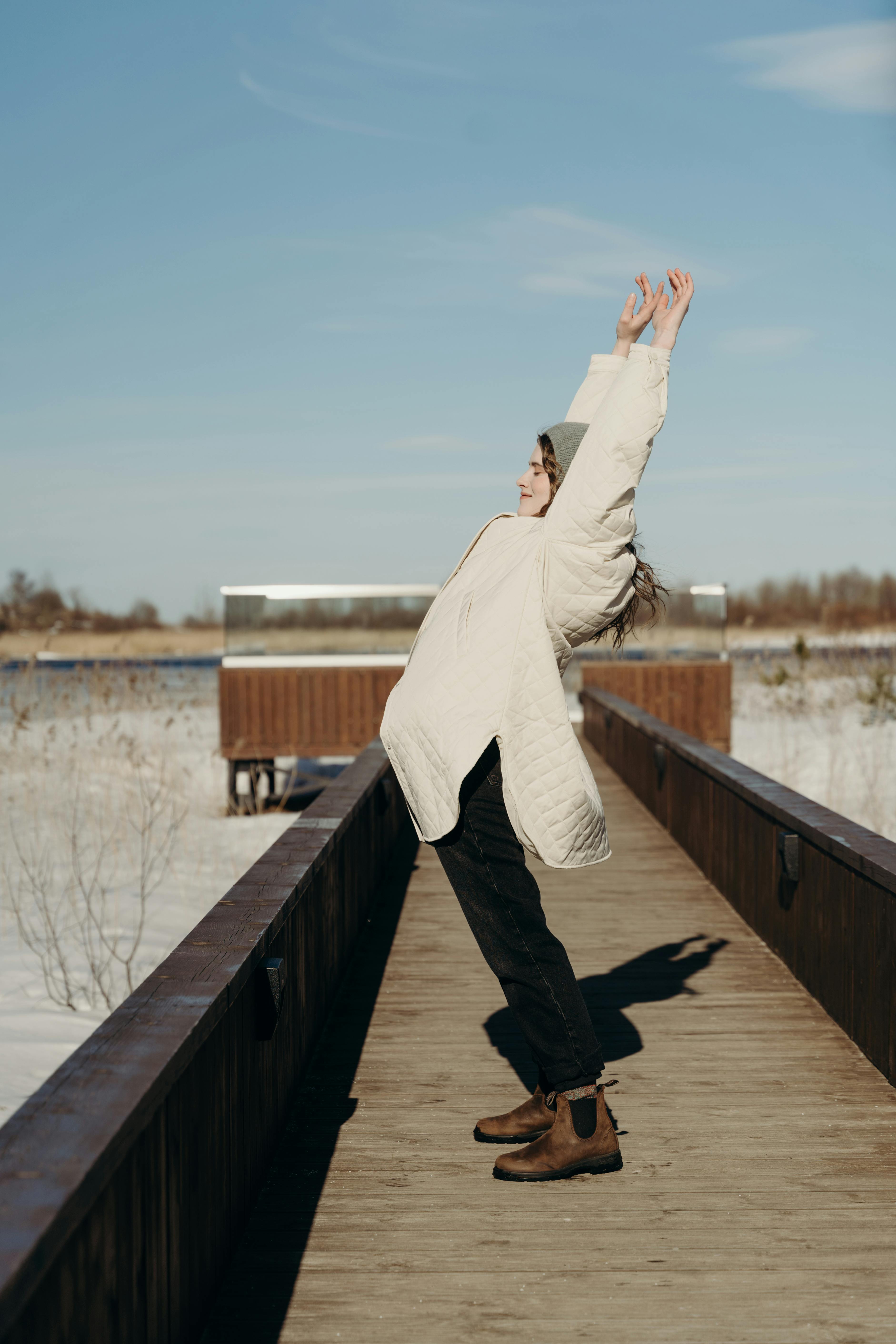 Girls Wearing Gym Clothes and Hats Doing Yoga Pose · Free Stock Photo