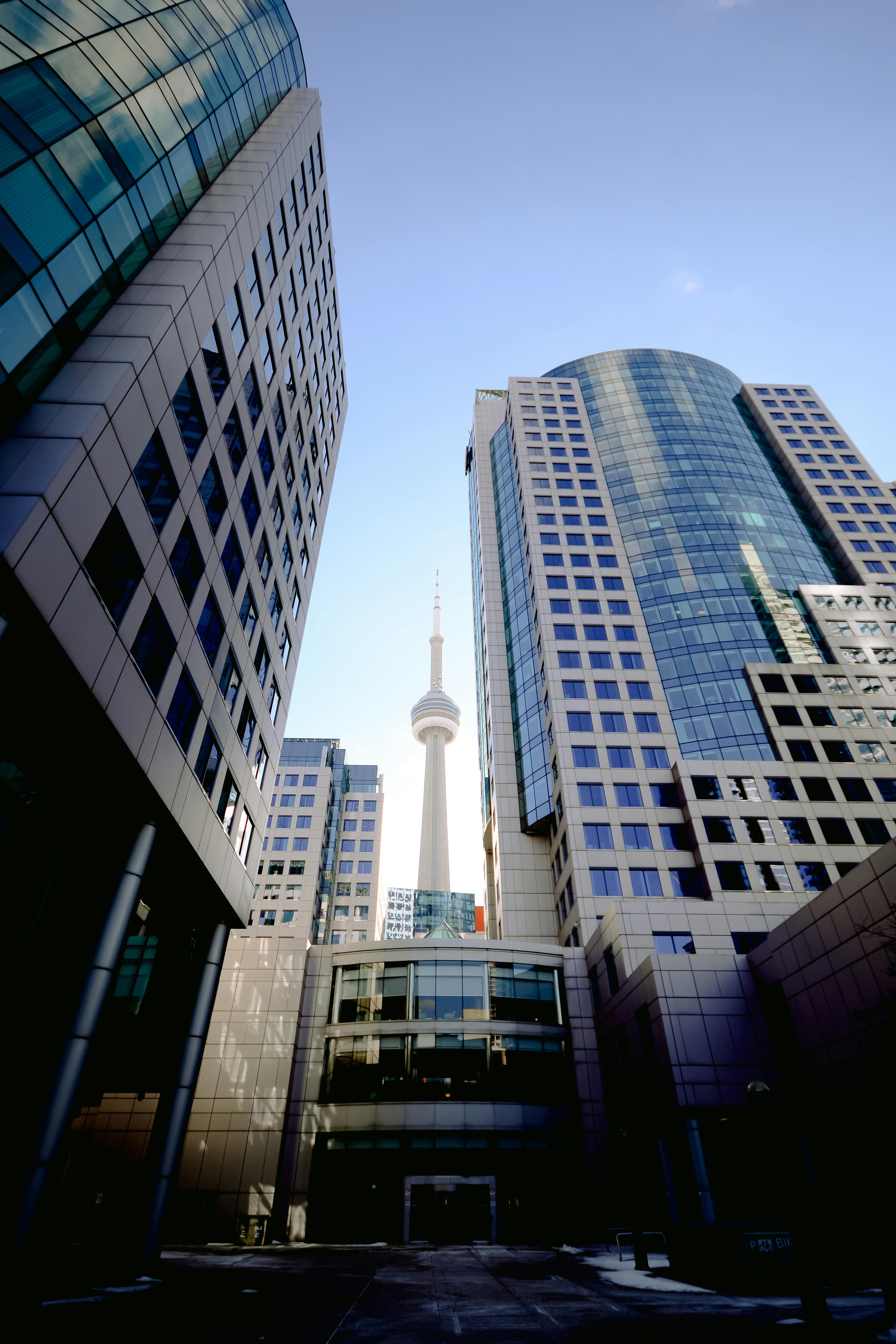 Observation tower amidst modern buildings · Free Stock Photo