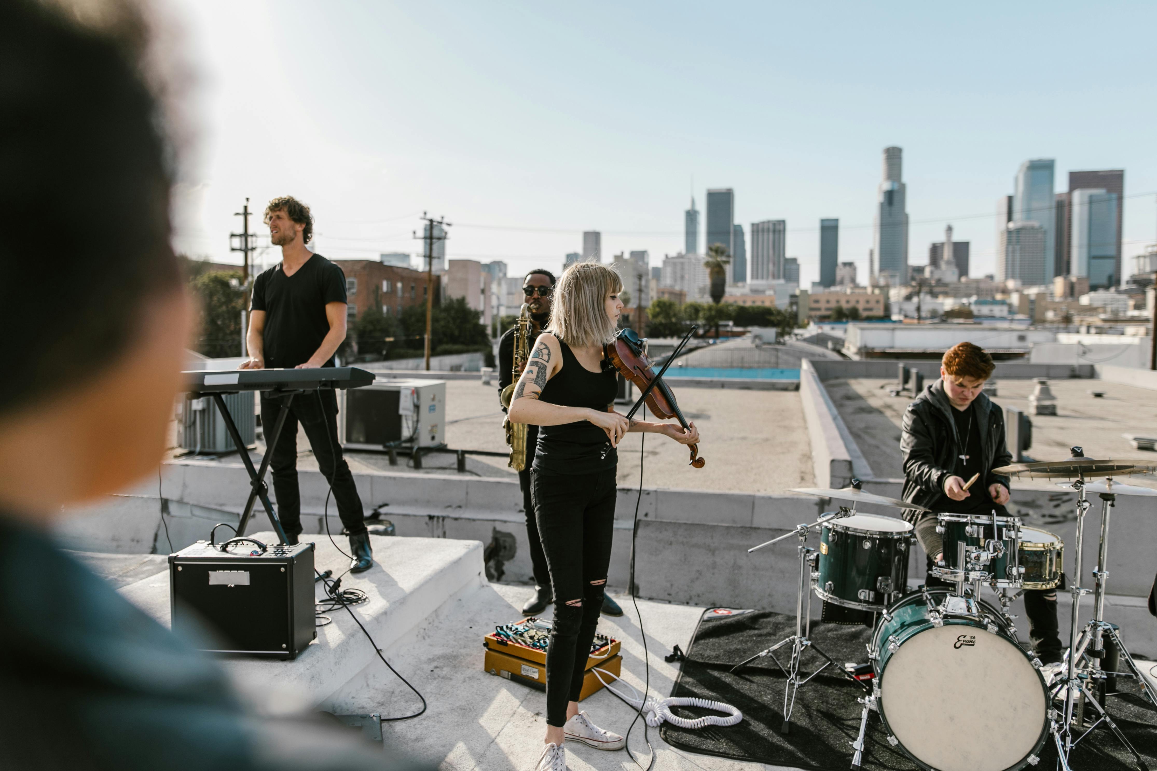 A Band Performing on the Rooftop · Free Stock Photo