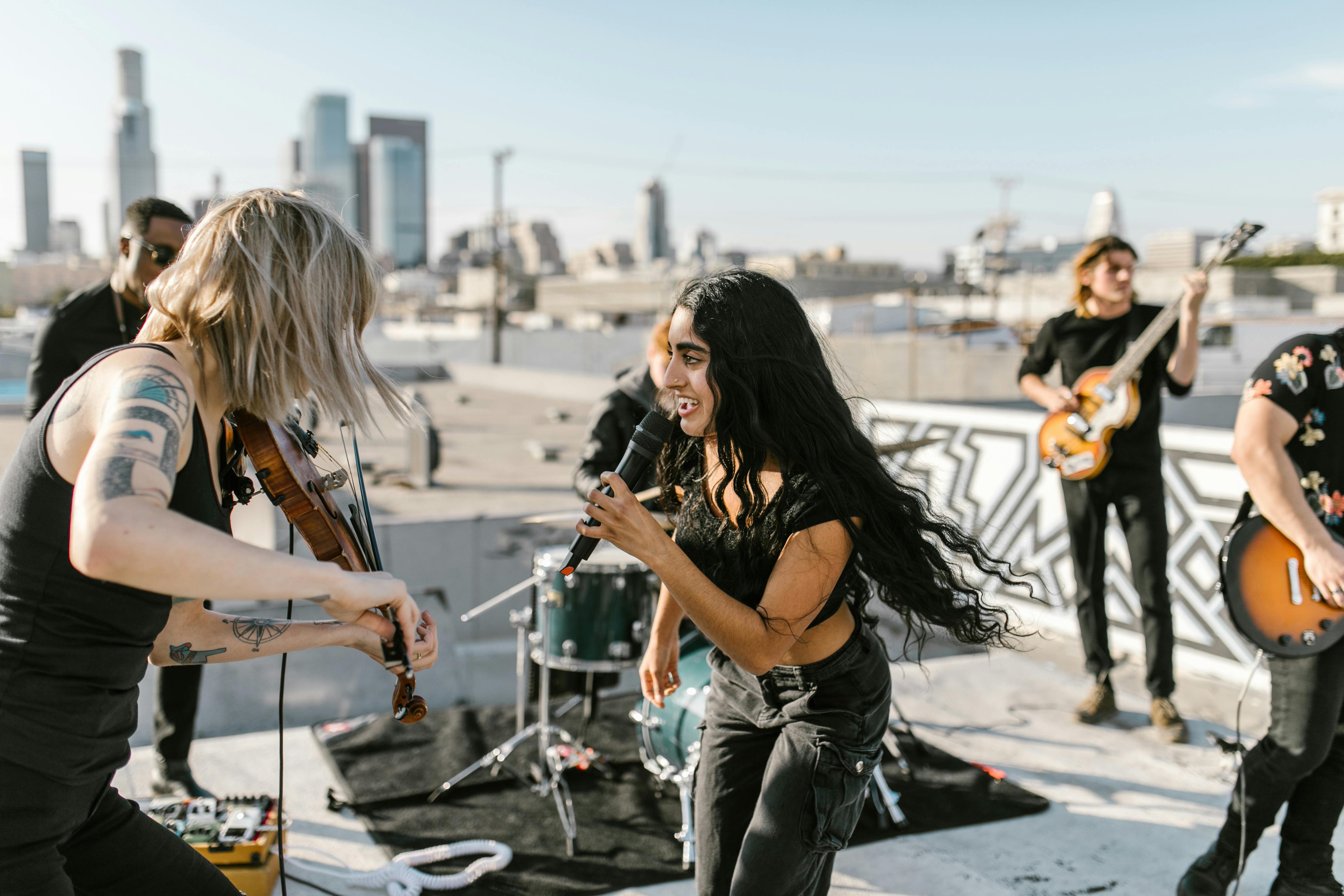 A Band Performing on the Rooftop · Free Stock Photo