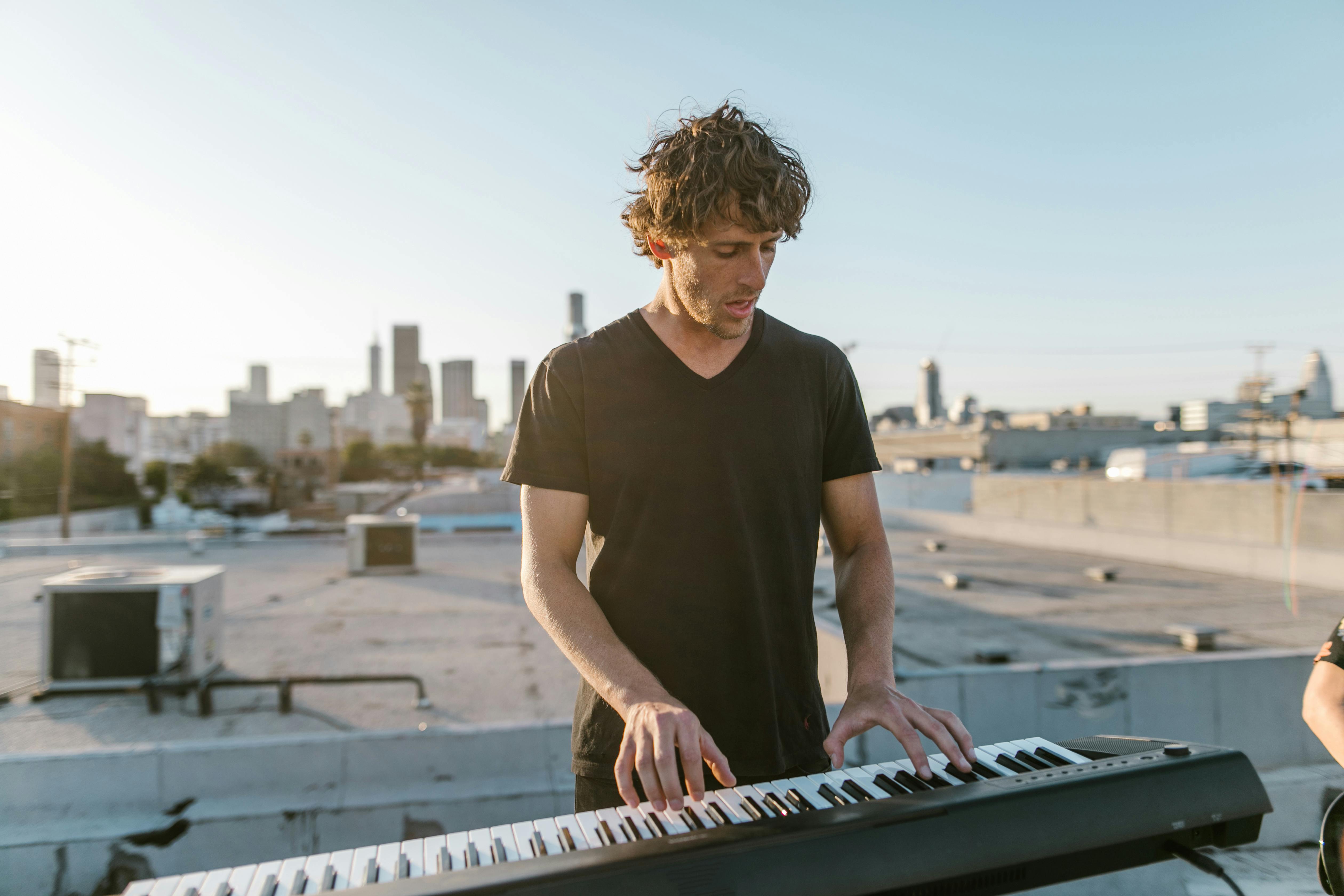 Man Playing Keyboard · Free Stock Photo