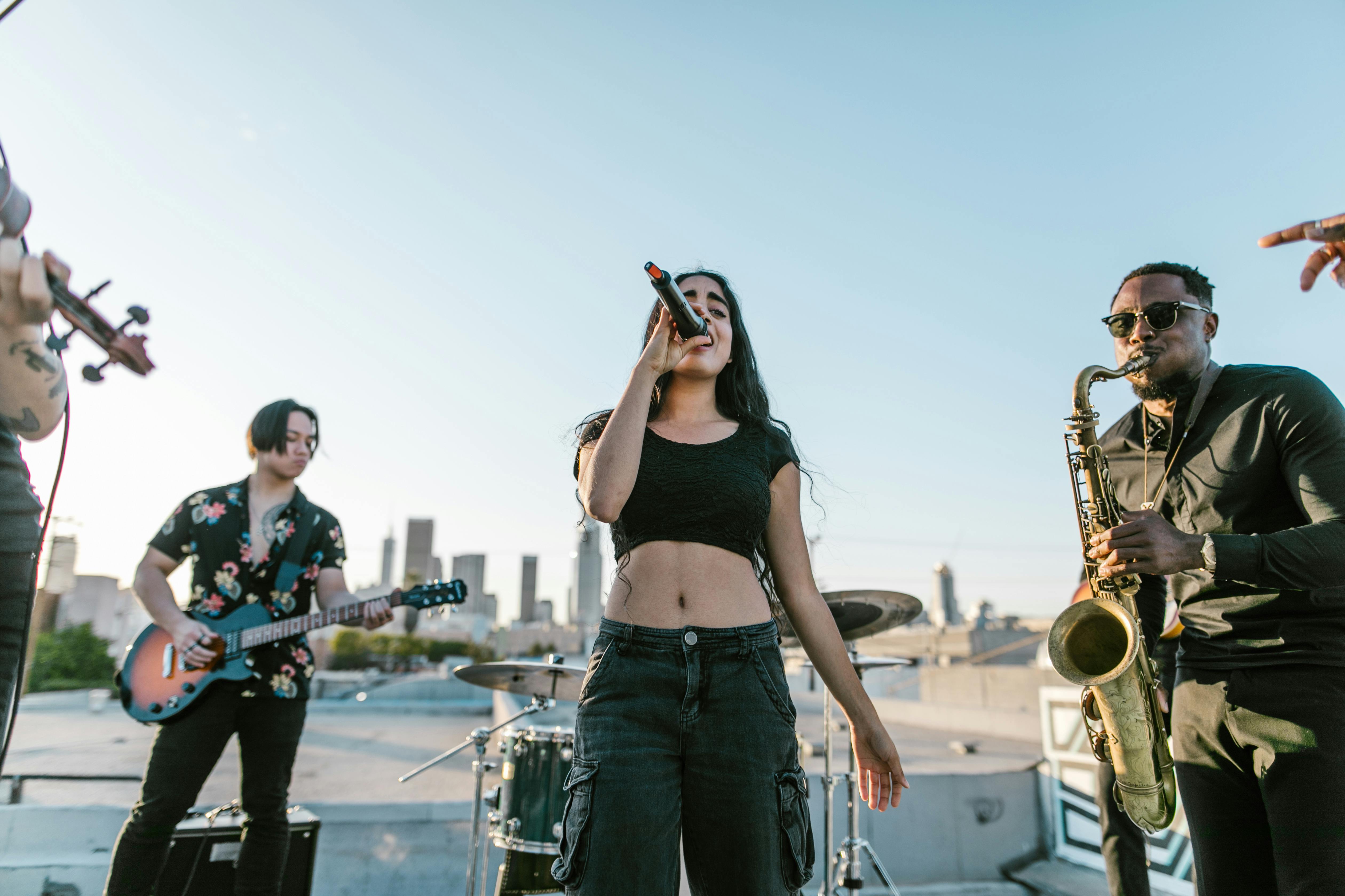 A Band Performing on the Rooftop · Free Stock Photo