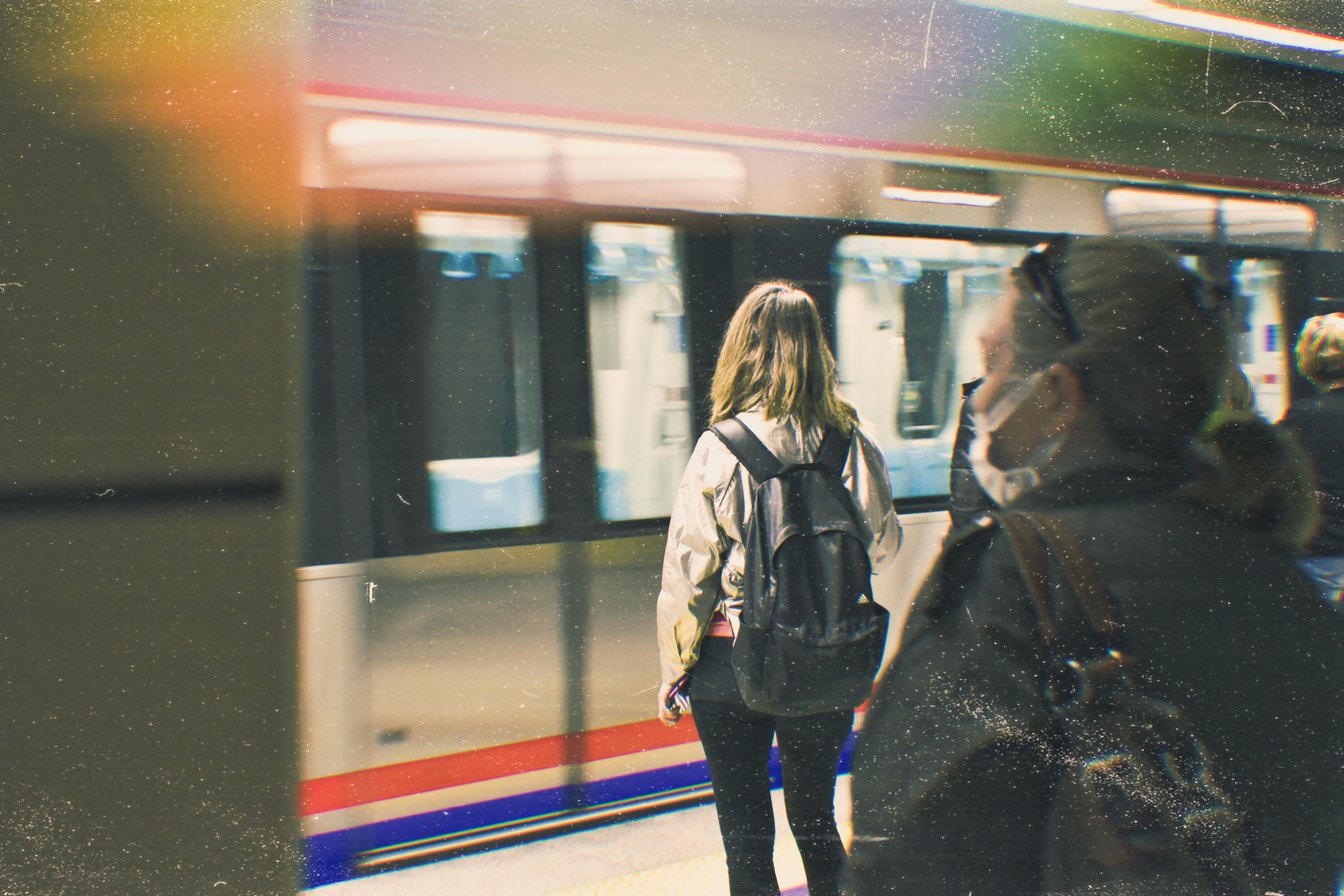 Woman Standing on Train Station · Free Stock Photo