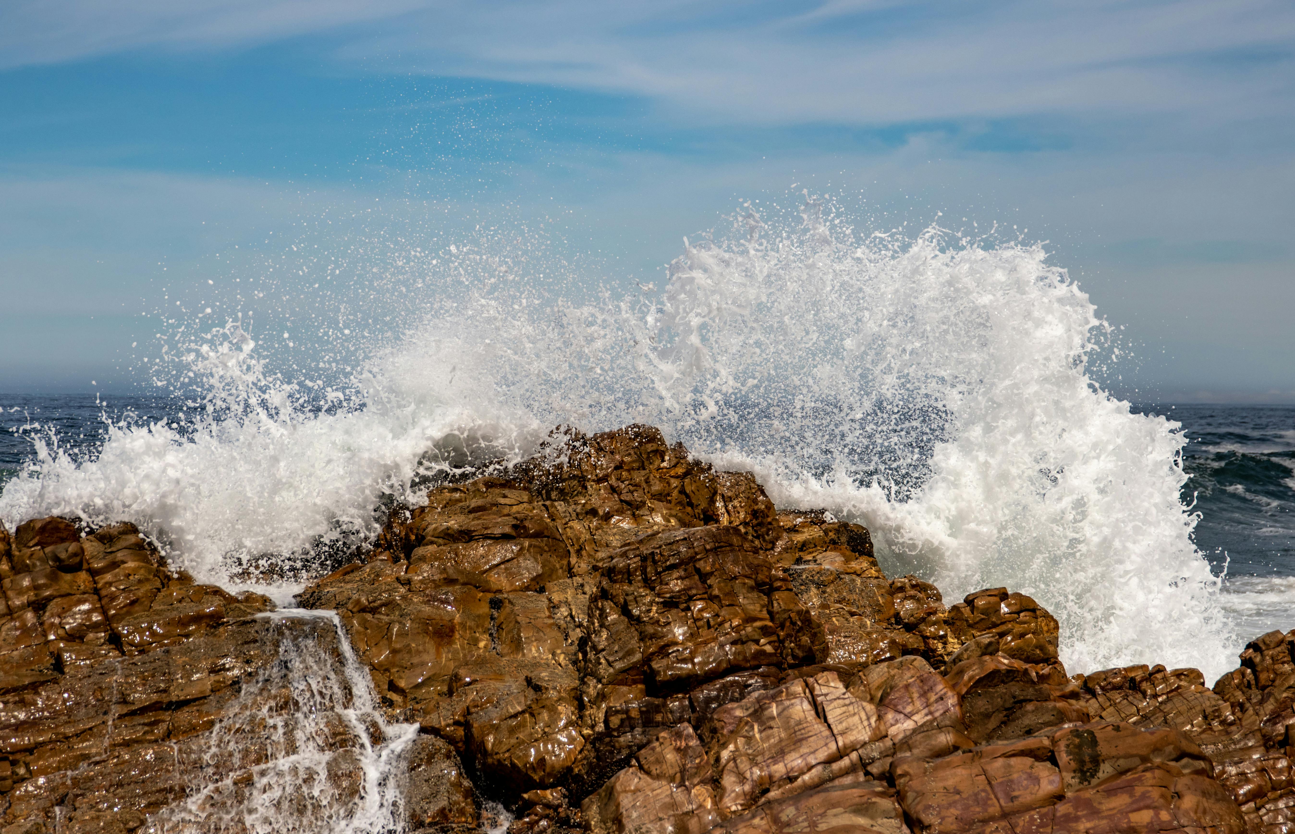 Sea Waves Hitting Rocks · Free Stock Photo