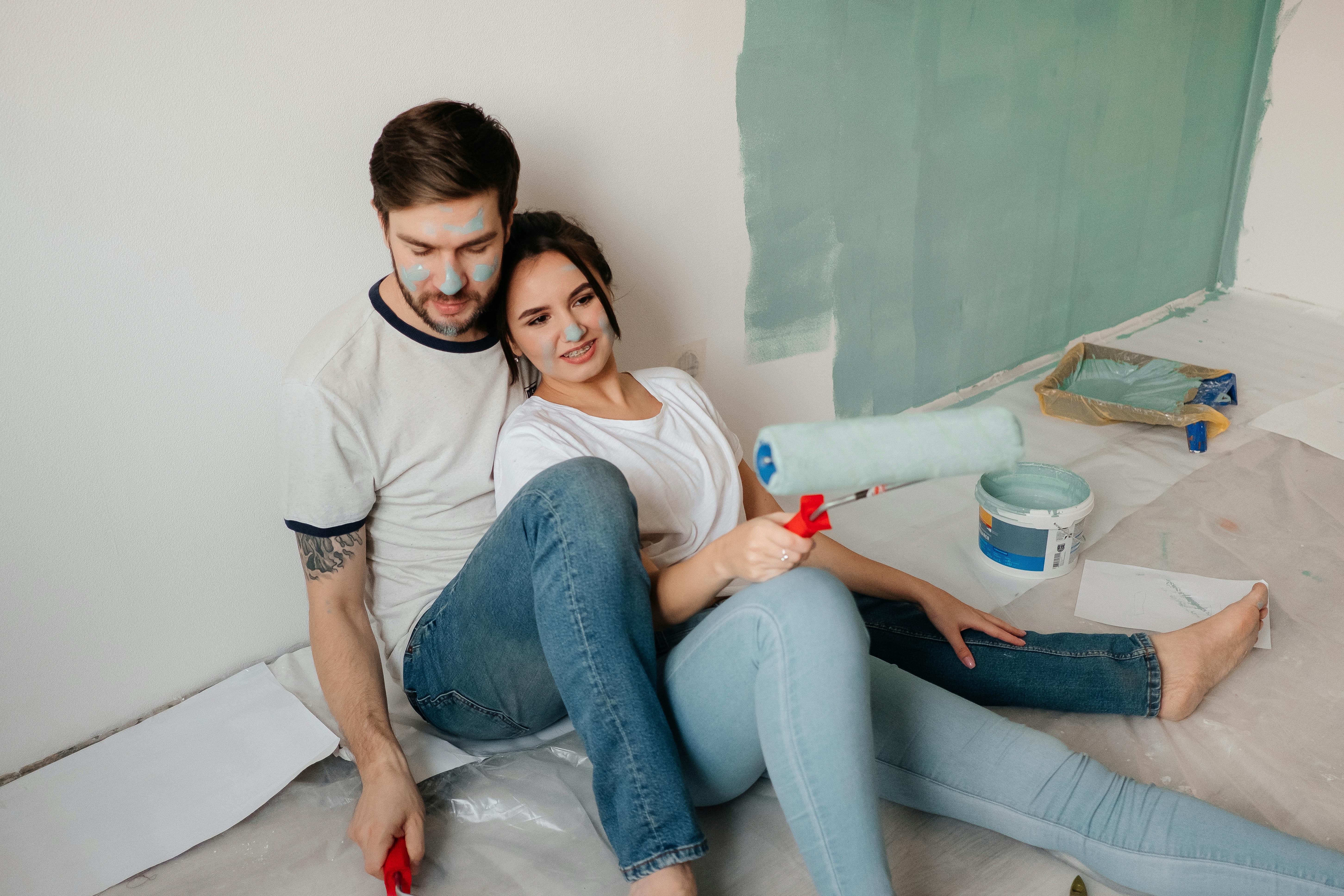 A Couple with Paint on their Faces · Free Stock Photo