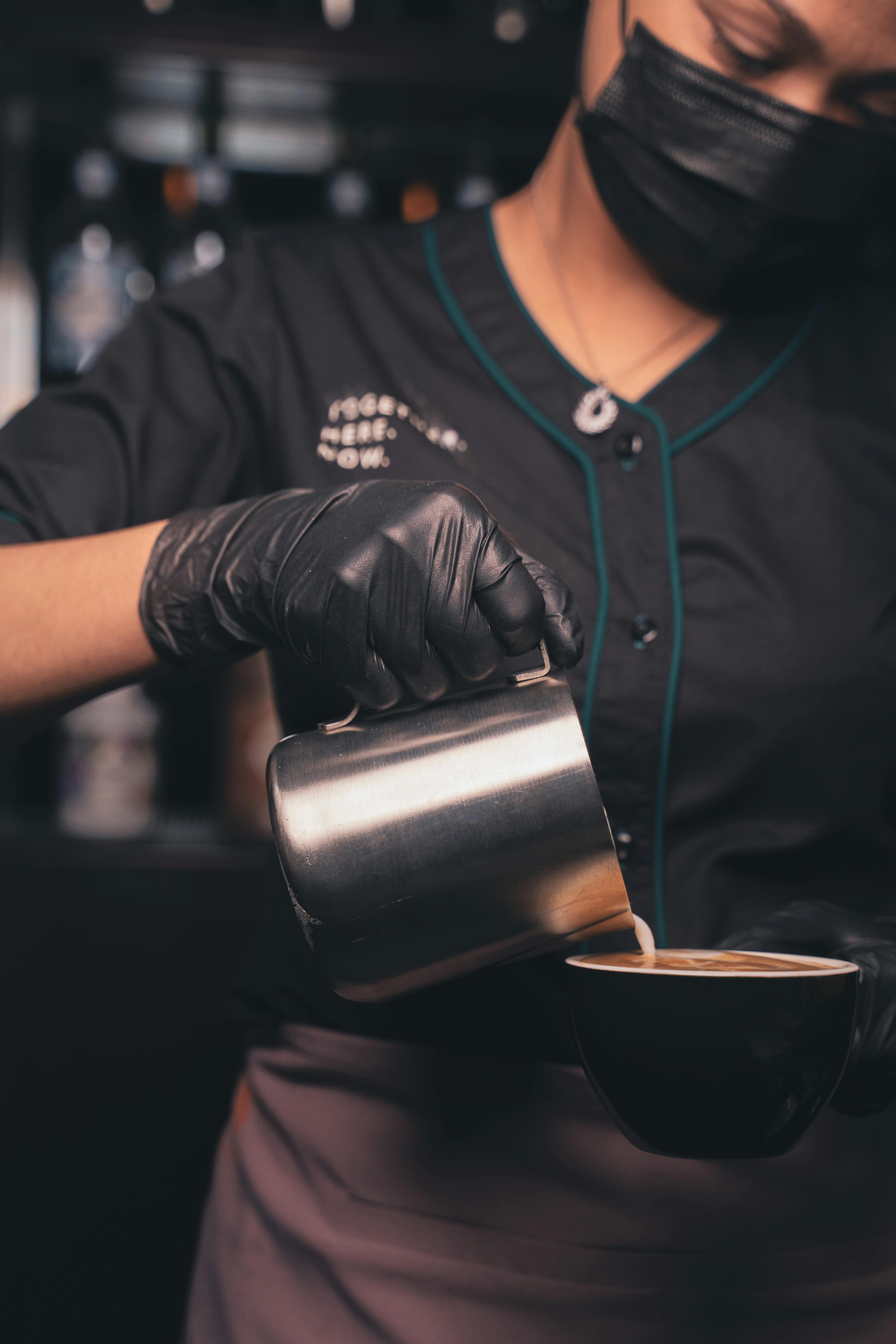 A Person Holding a Cup · Free Stock Photo