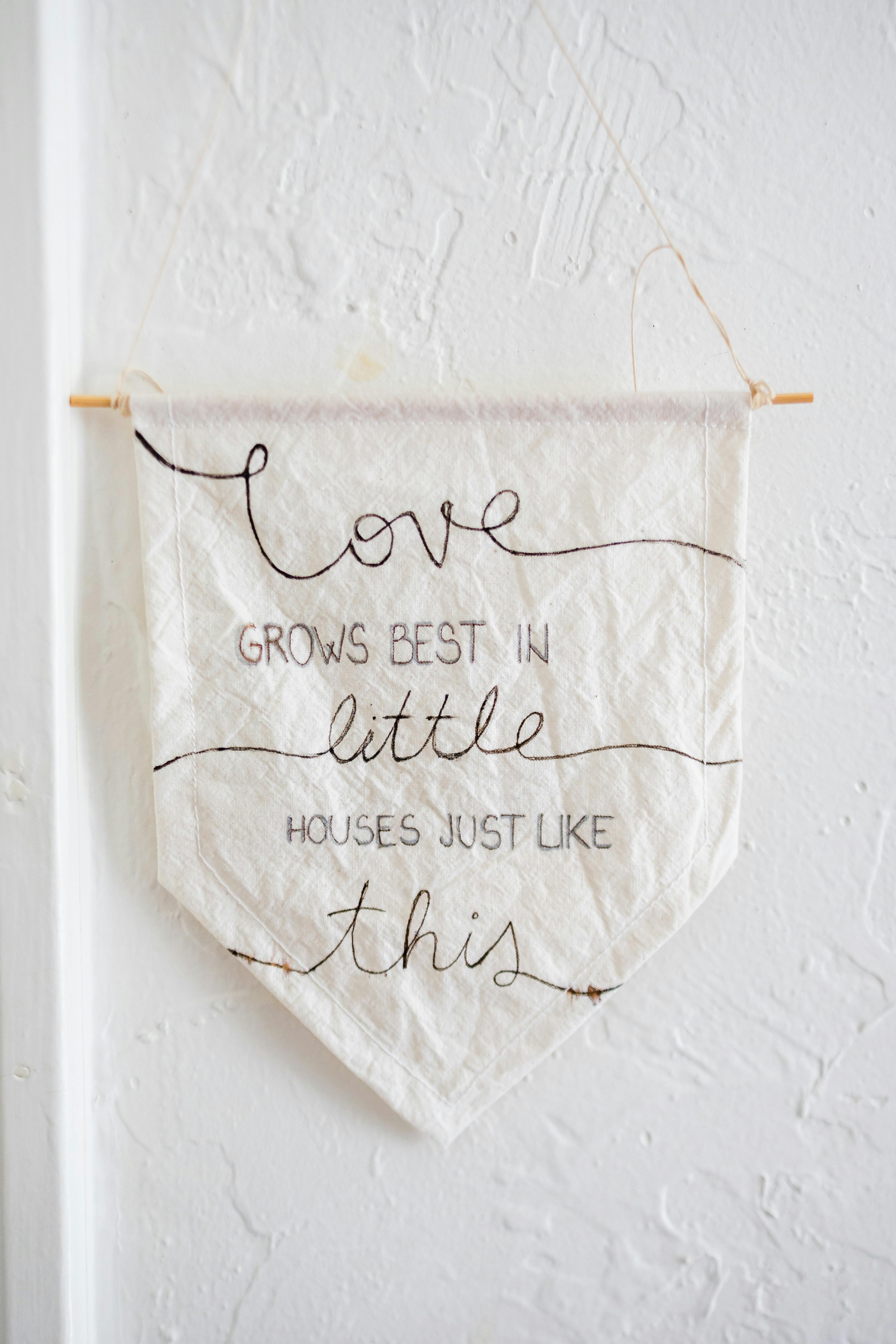 White cotton cloth with inscription on black font · Free Stock Photo