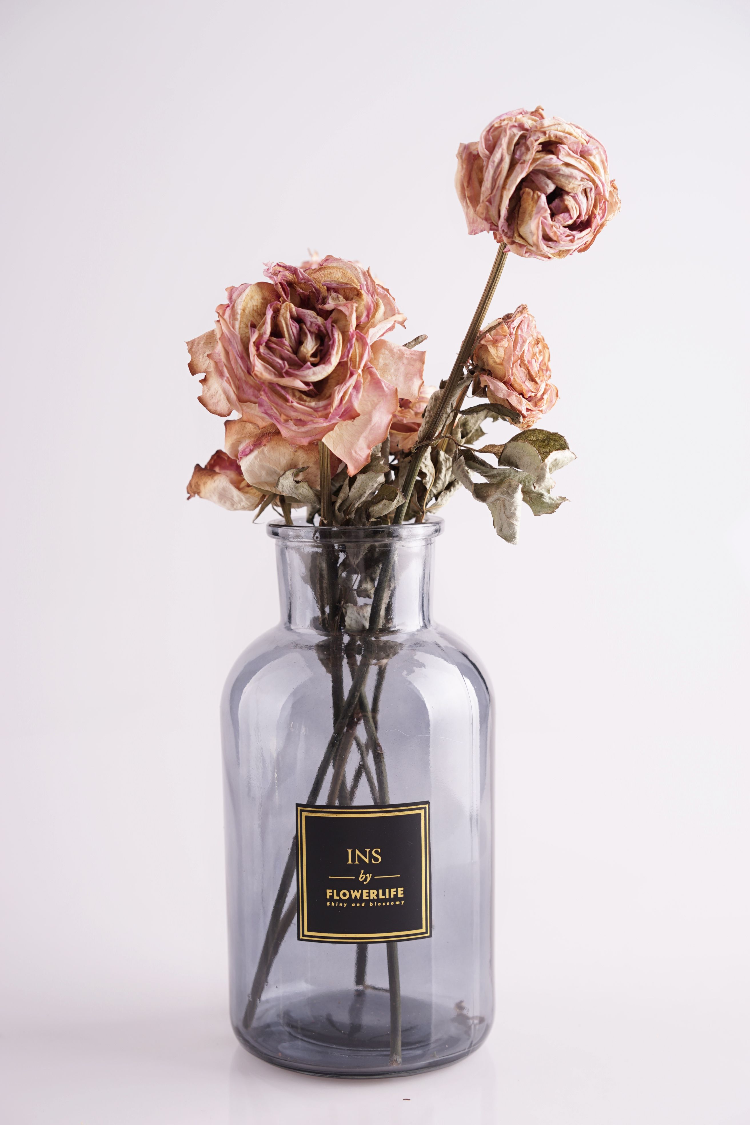 Flowers in a Glass Vase on a Wooden Table · Free Stock Photo