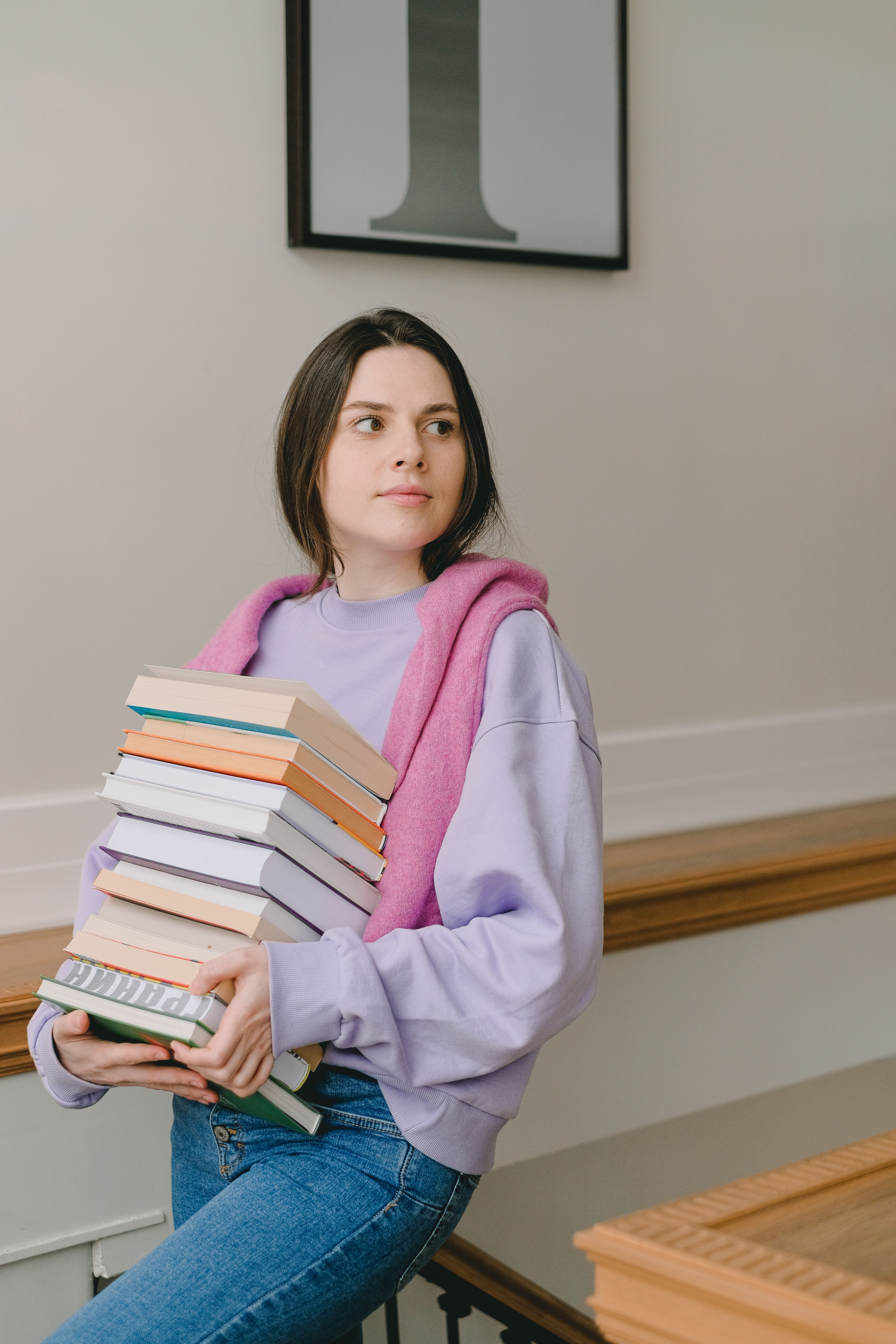 Woman Carrying Books · Free Stock Photo