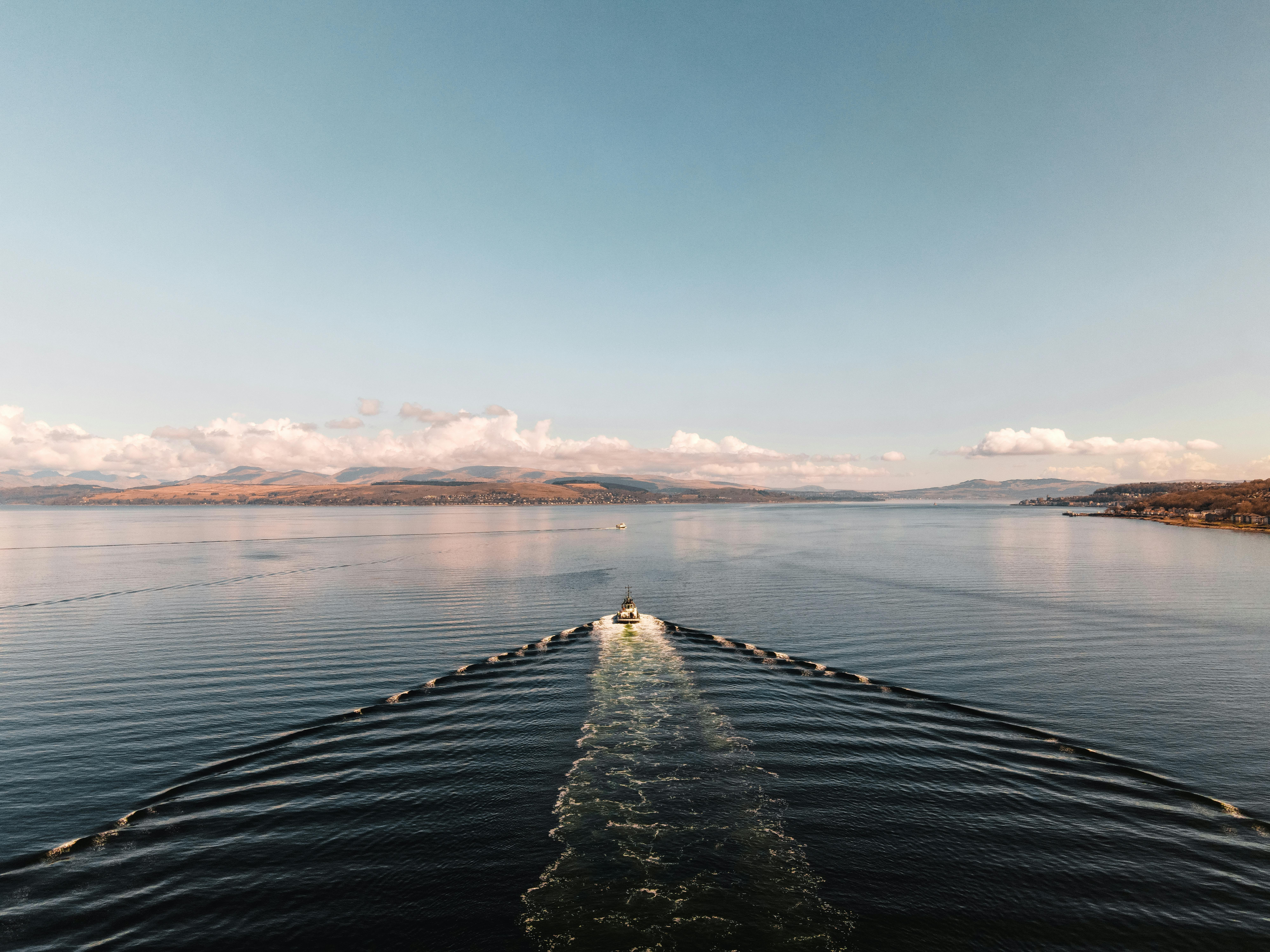 Water Trail and Ripples Left by a Motorboat on the Sea · Free Stock Photo