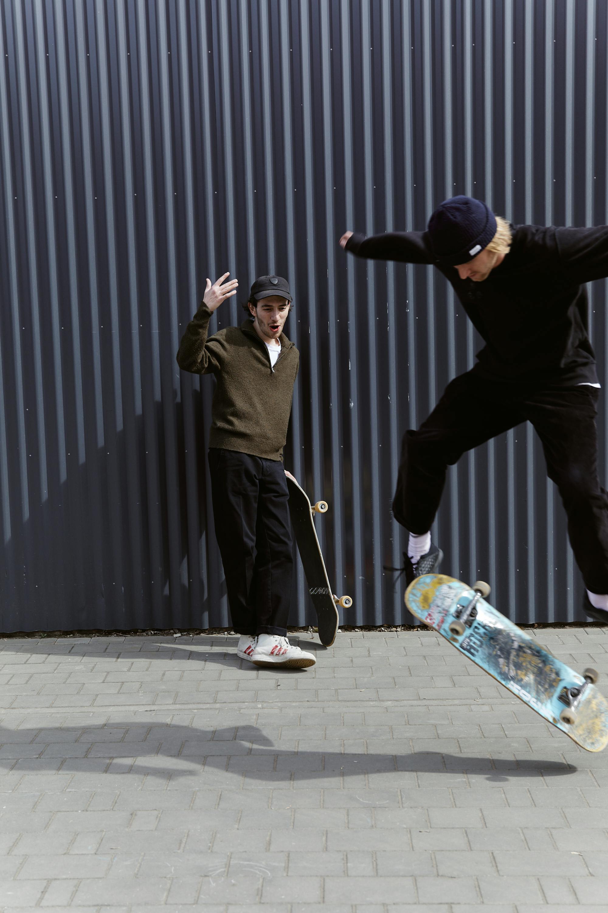 A Skateboarder Performing Flip Tricks · Free Stock Photo