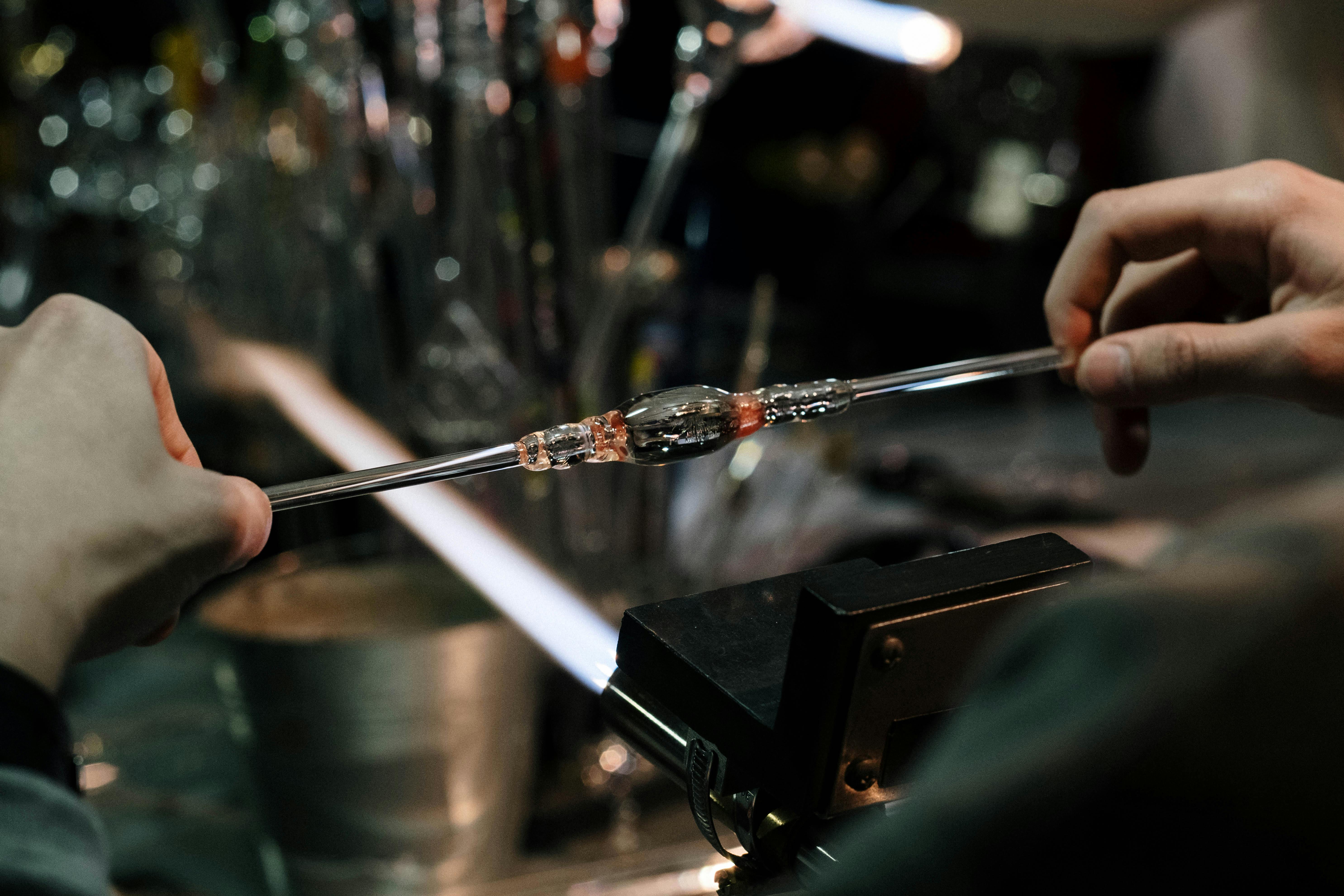 A Person Holding a Glass Tube · Free Stock Photo
