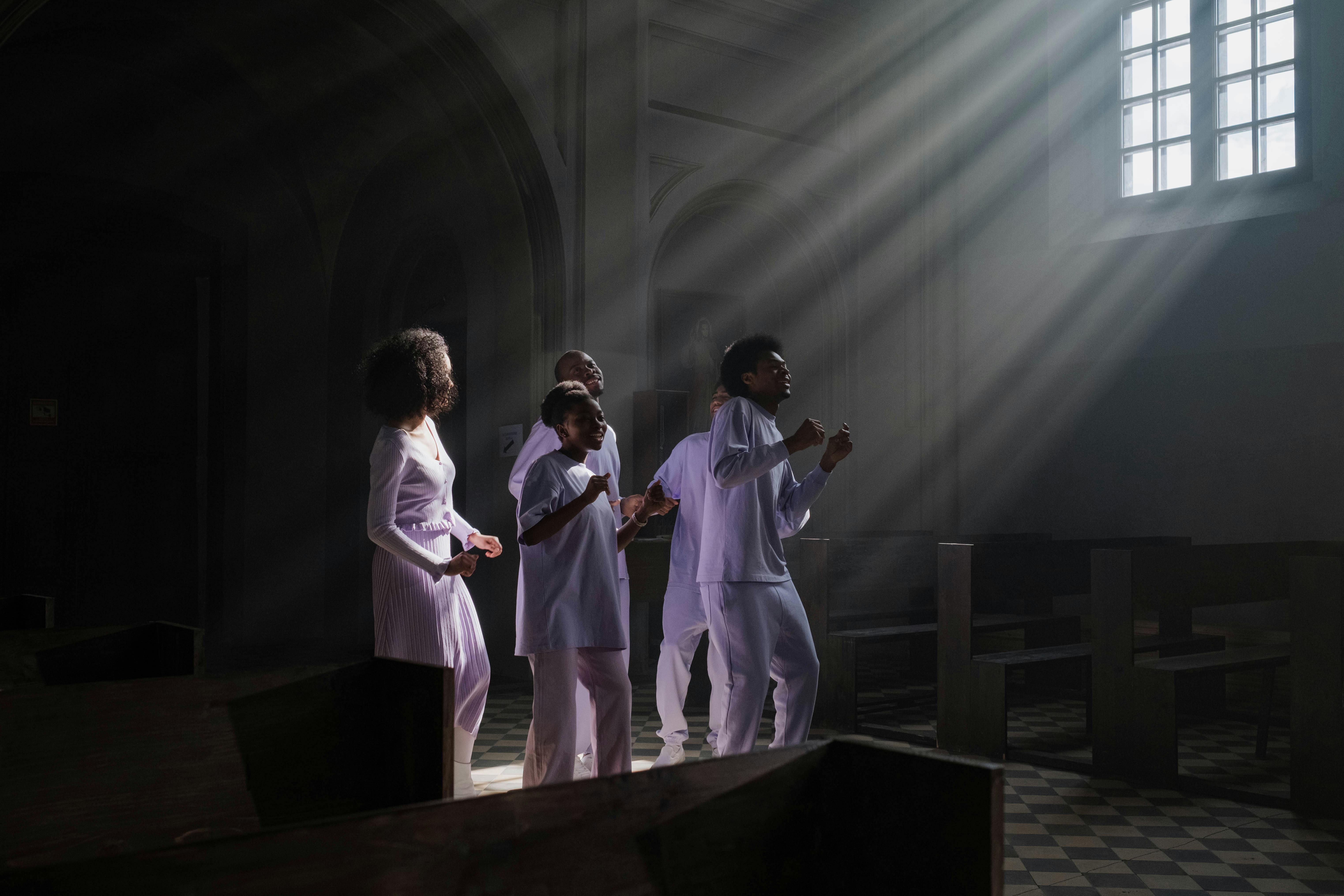 Group of People in Lilac Uniform Doing Church Service · Free Stock Photo