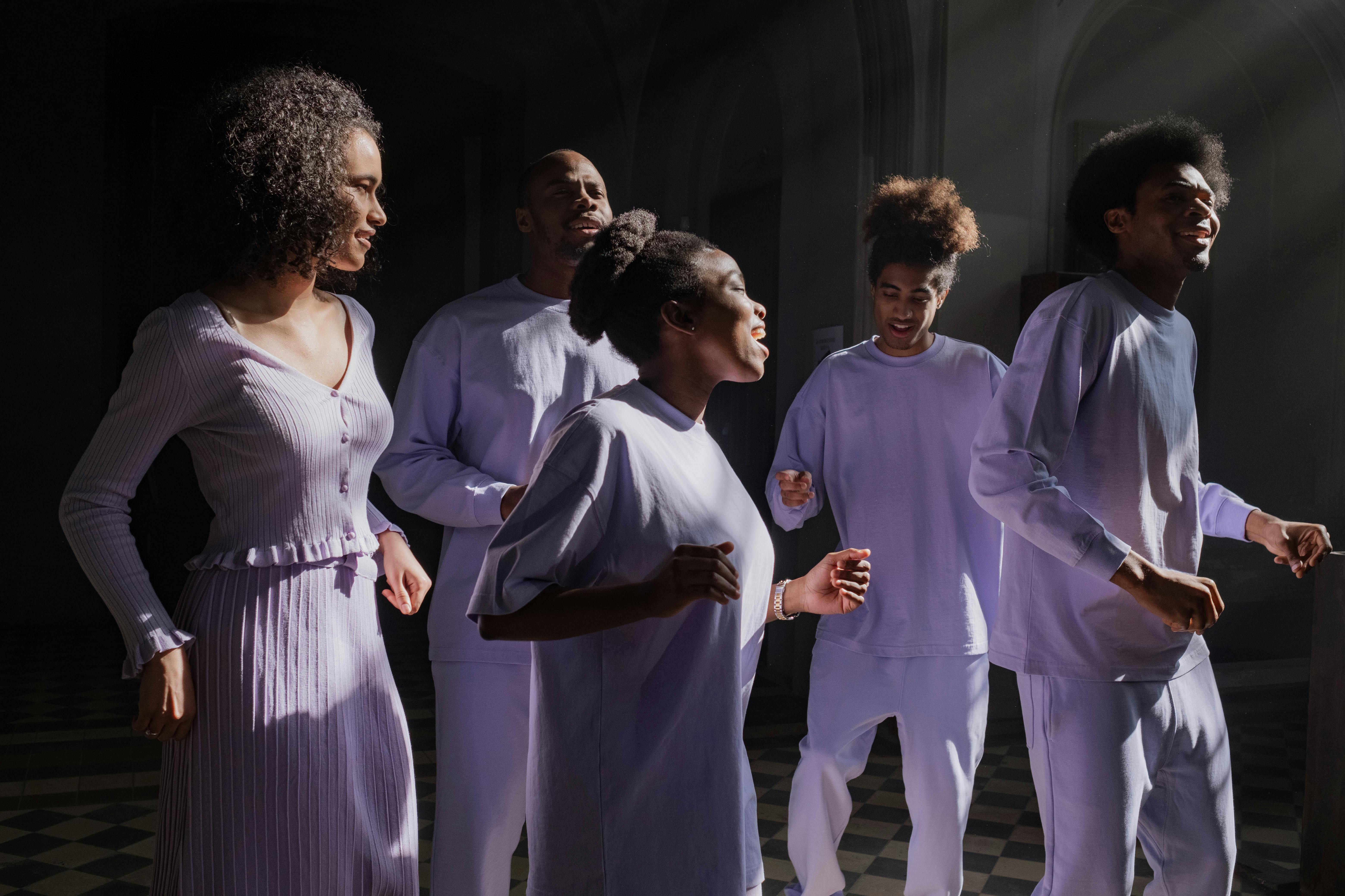 Group of People in Lilac Uniform Doing Church Service · Free Stock Photo