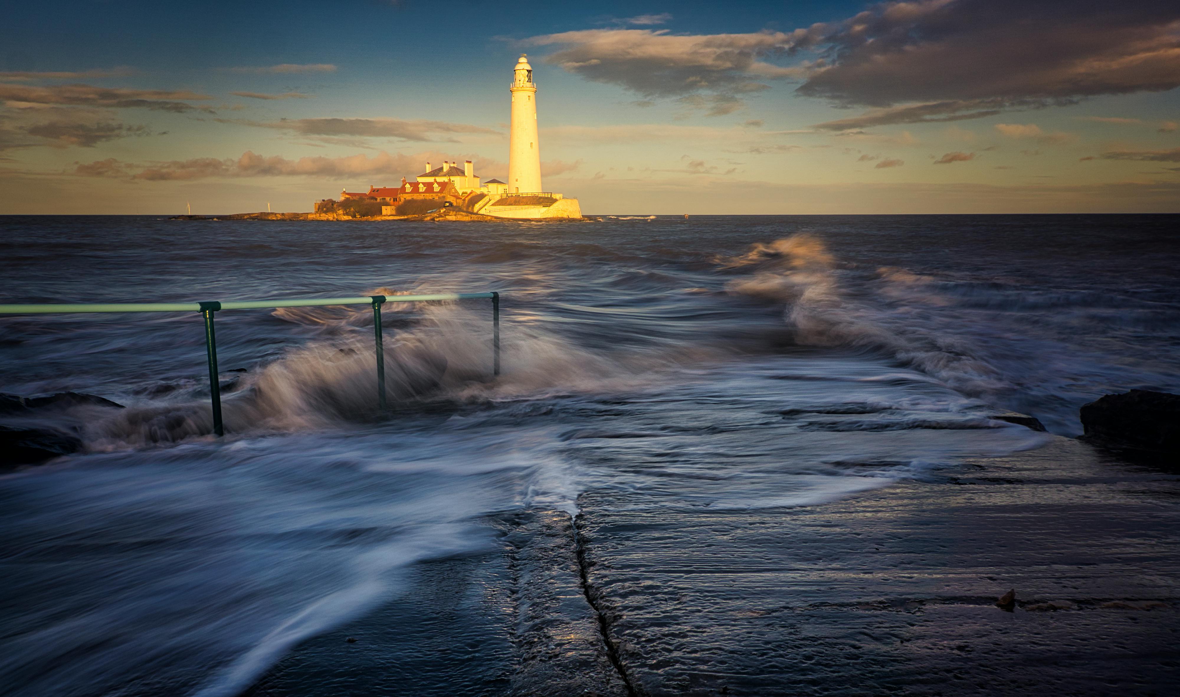 Waves and Lighthouse in Background · Free Stock Photo