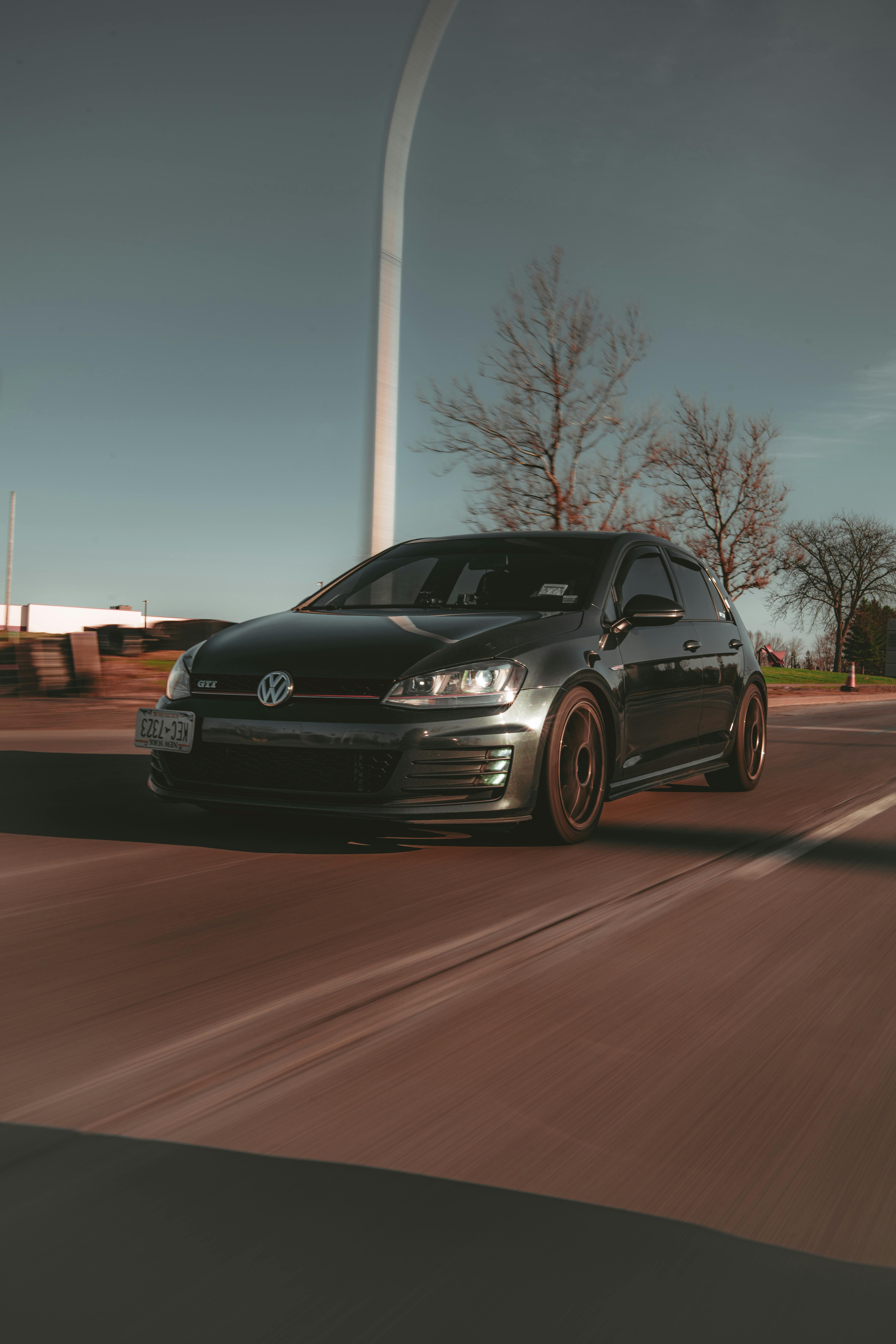 Photo of a Blue Car on the Road · Free Stock Photo