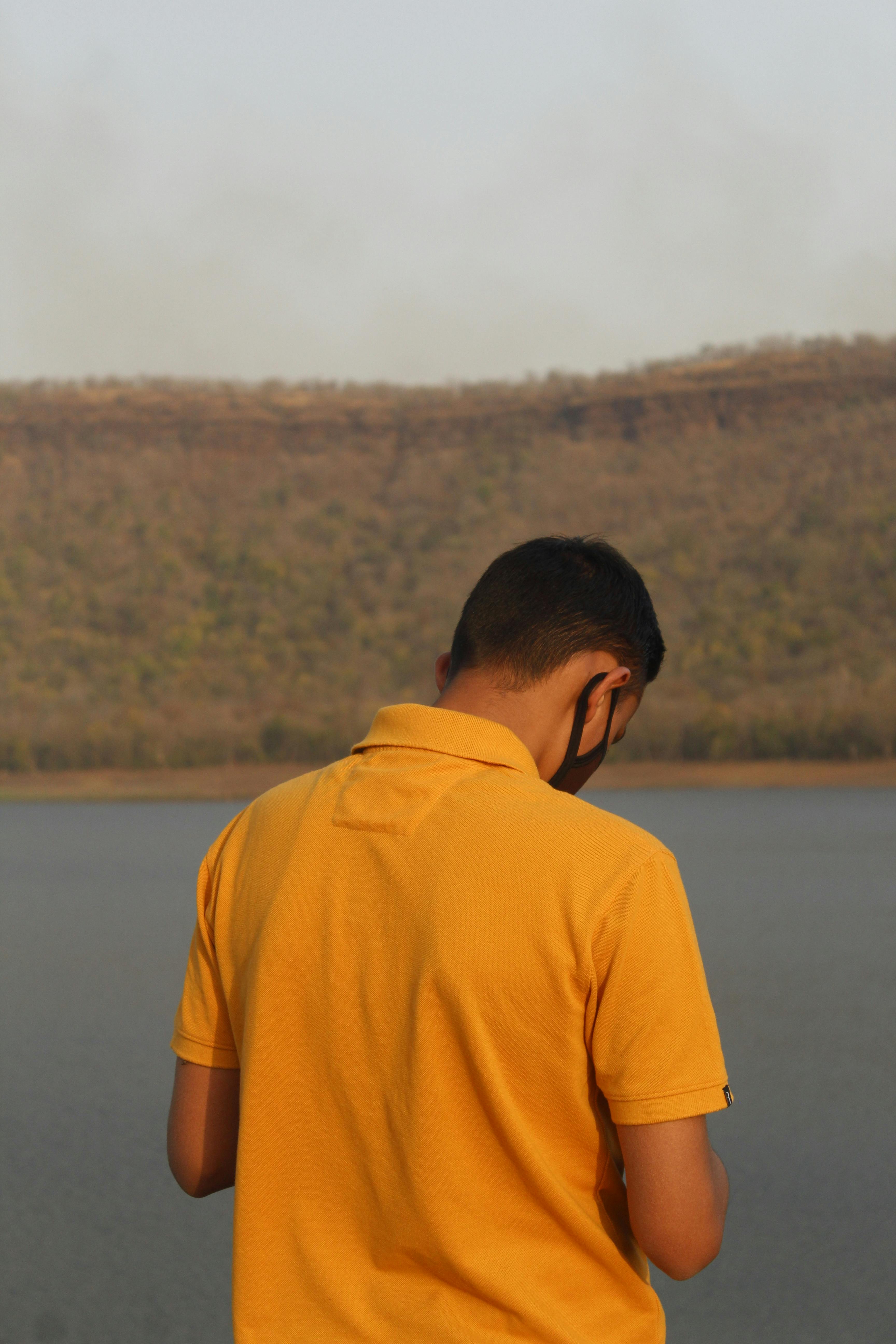 Back View of a Person Wearing Face Mask · Free Stock Photo