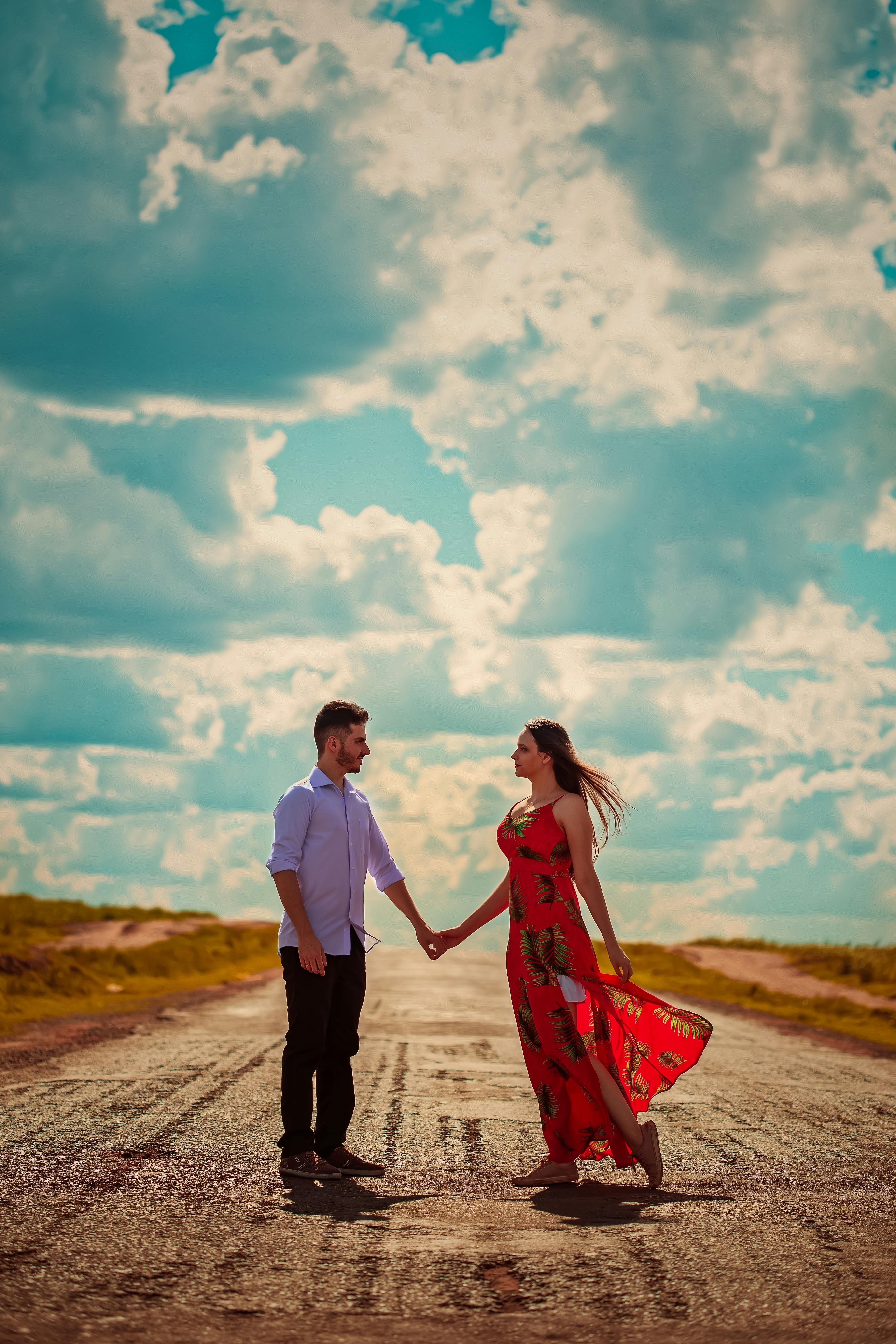 A Couple Standing on the Road · Free Stock Photo