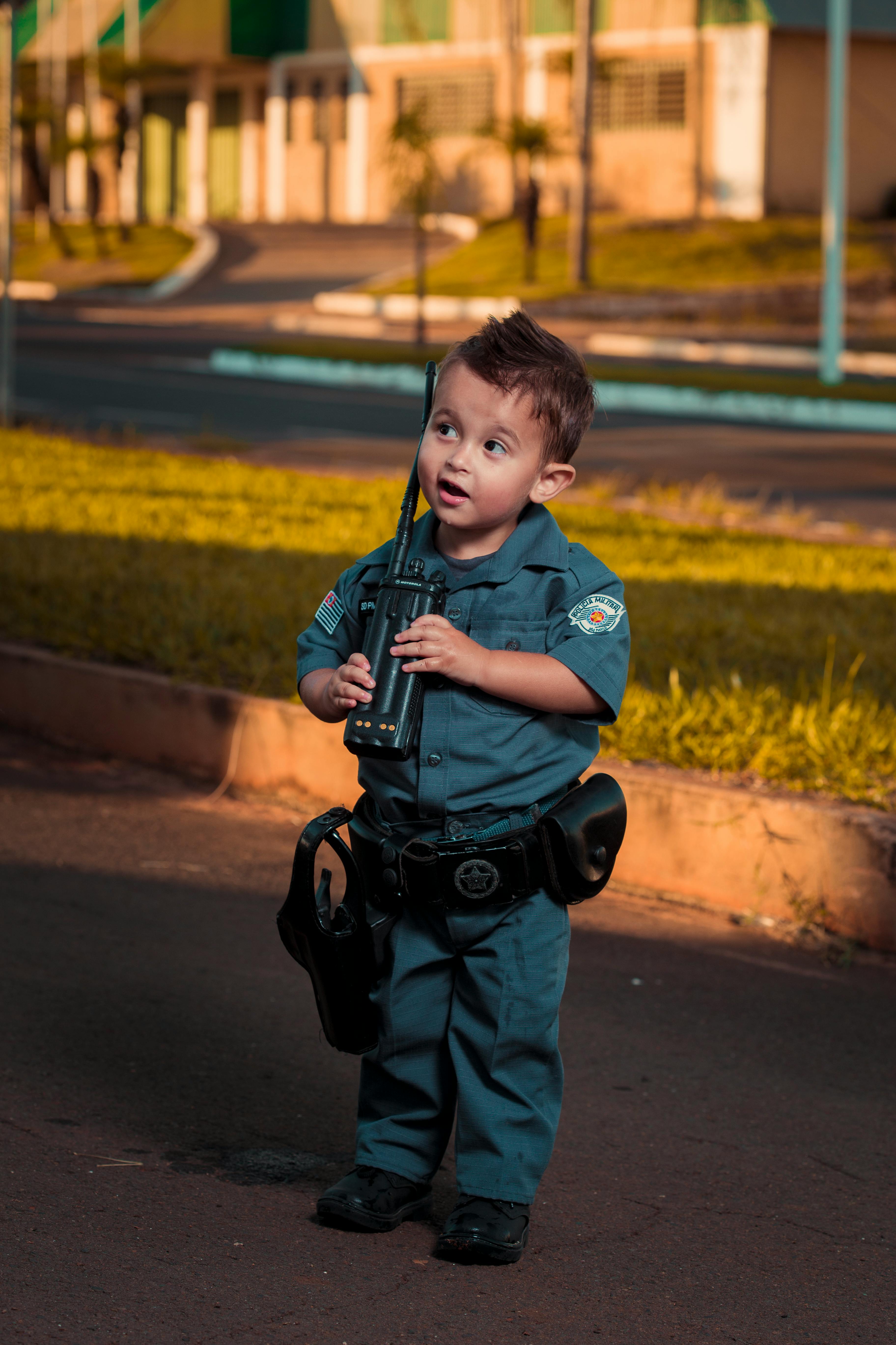 Boy in Policemans Uniform · Free Stock Photo