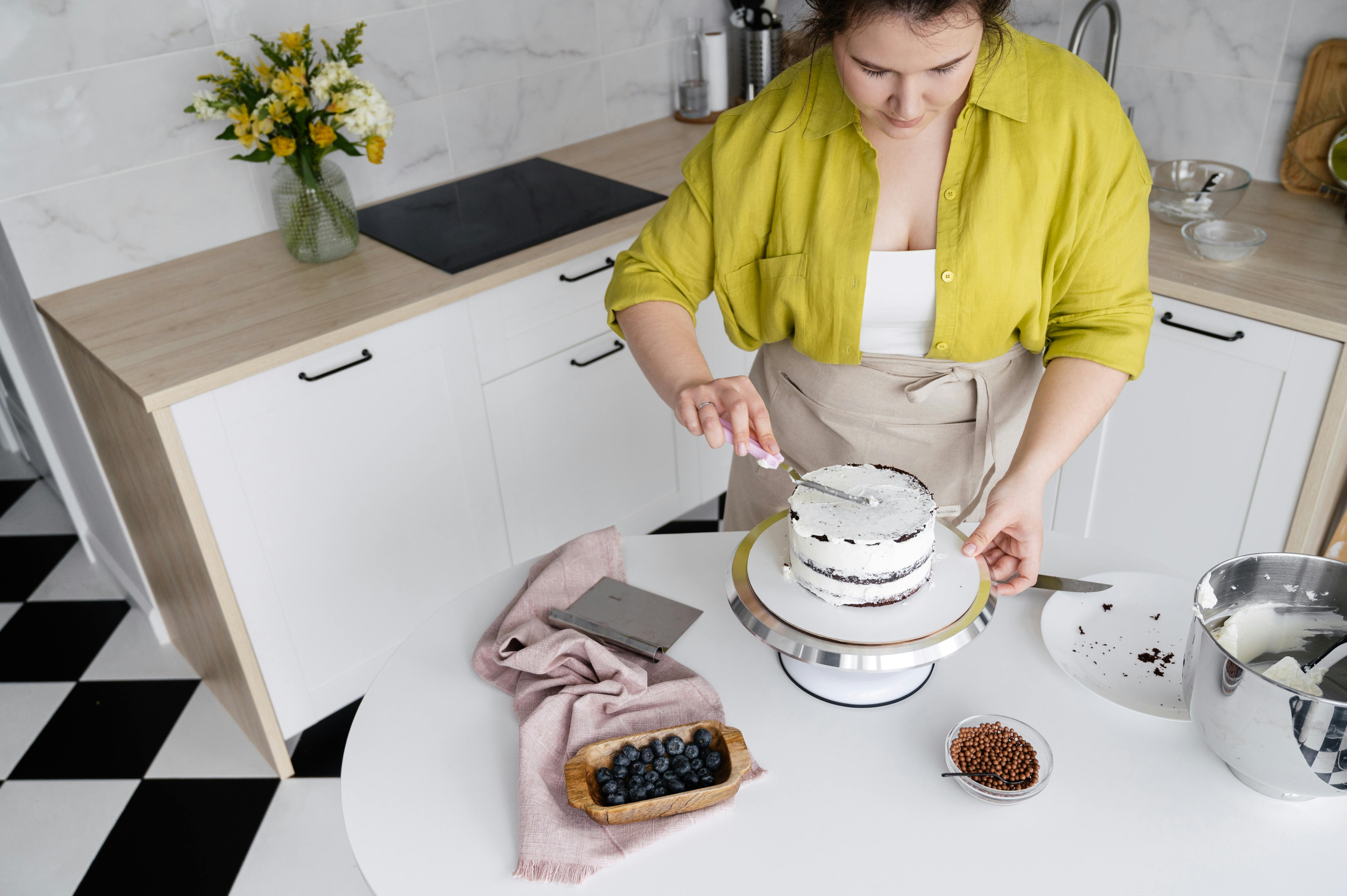 Crop woman preparing sweet cake · Free Stock Photo