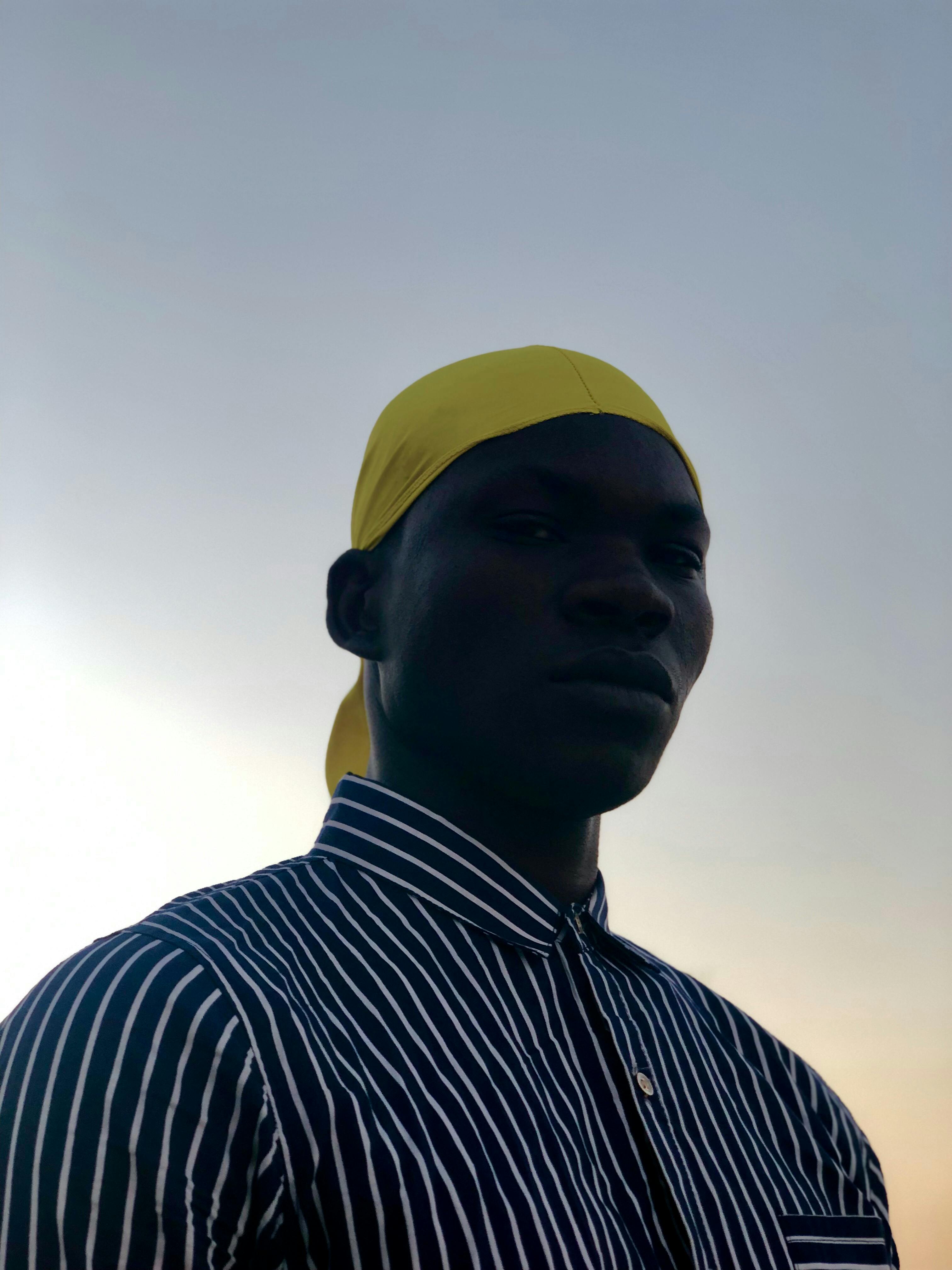 Shirtless Man Wearing Red Durag Smiling · Free Stock Photo