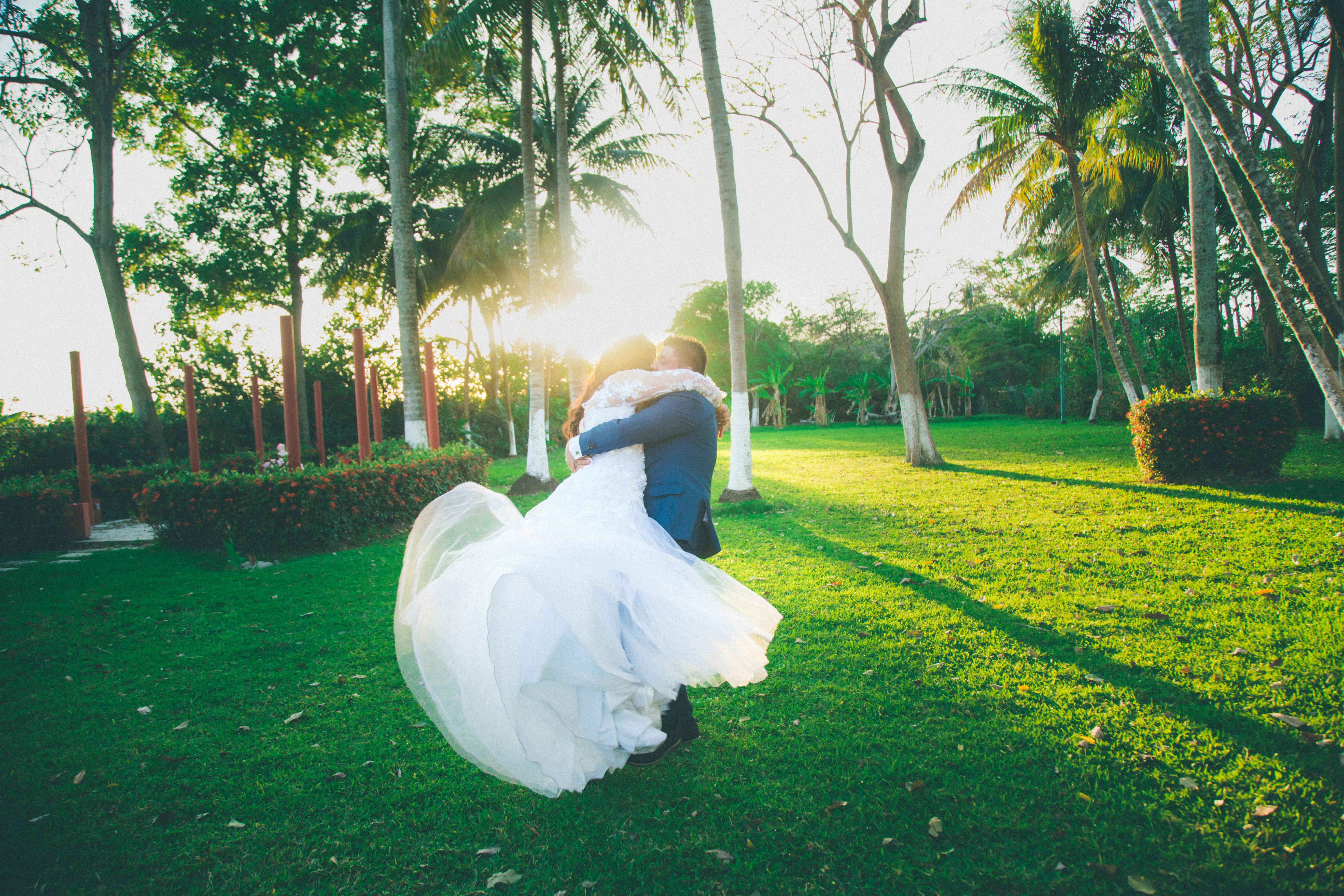 Man Carrying His Bride · Free Stock Photo