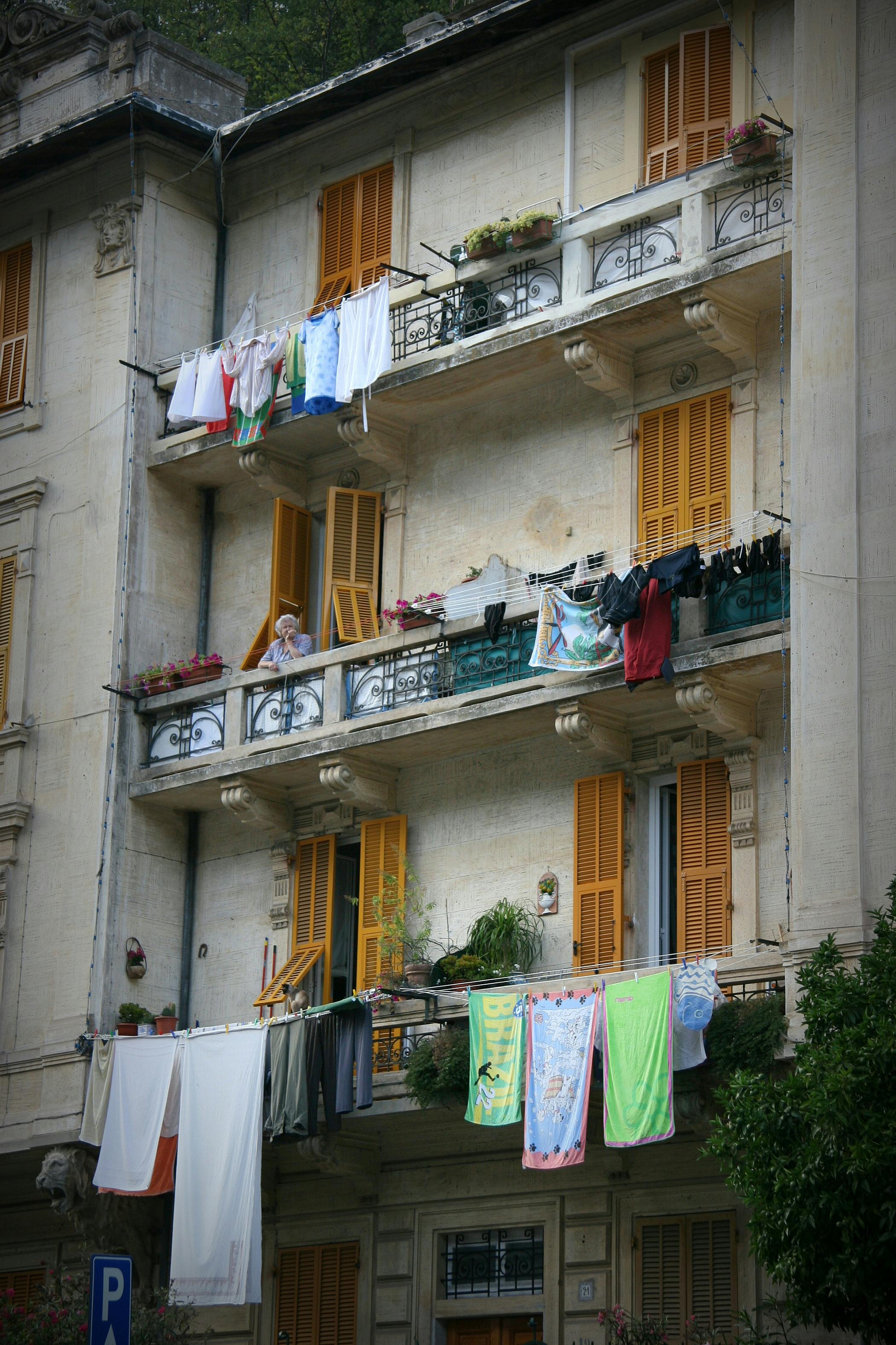 Laundry Drying on Balcony Clotheslines · Free Stock Photo
