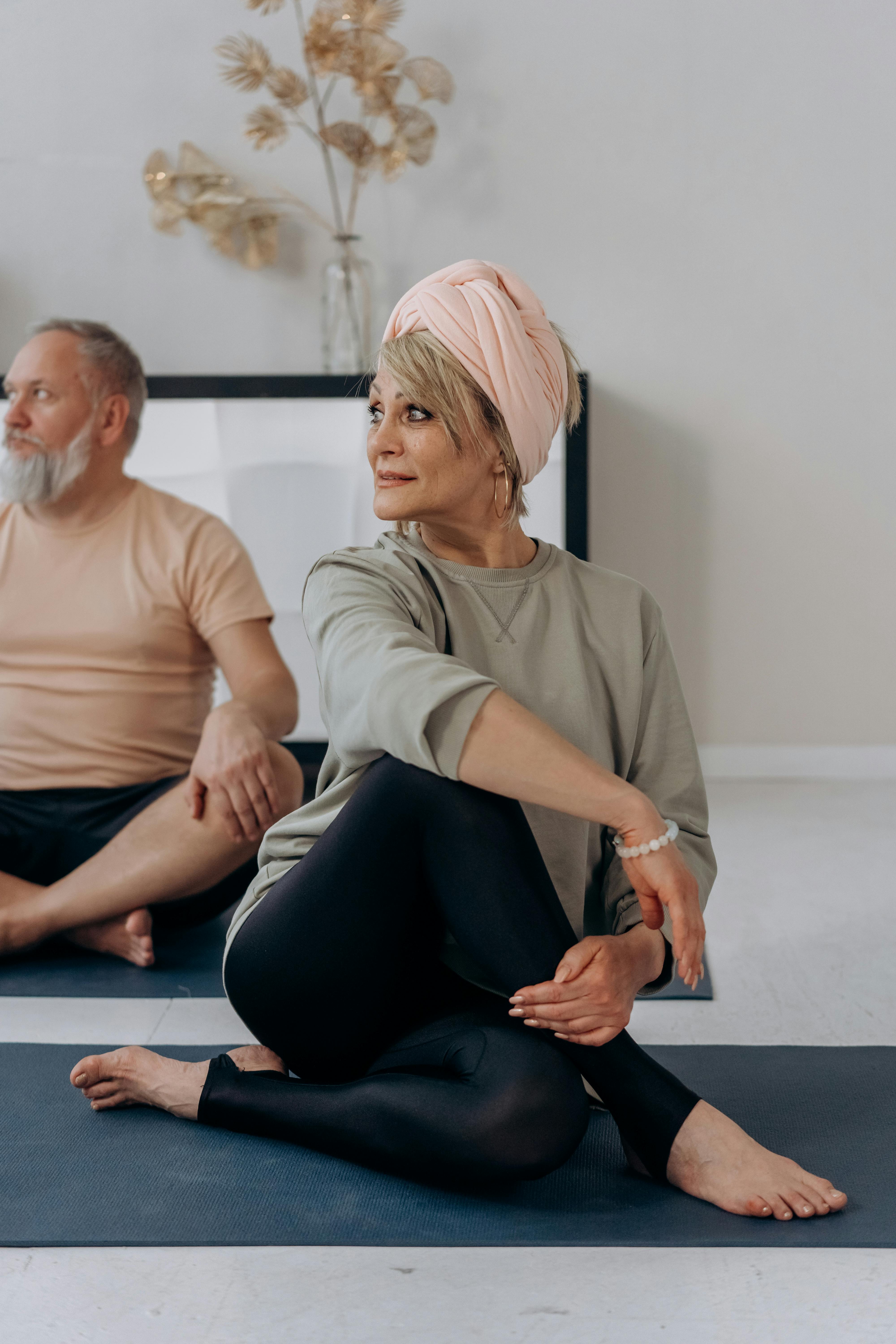 People Sitting On A Yoga Mat · Free Stock Photo
