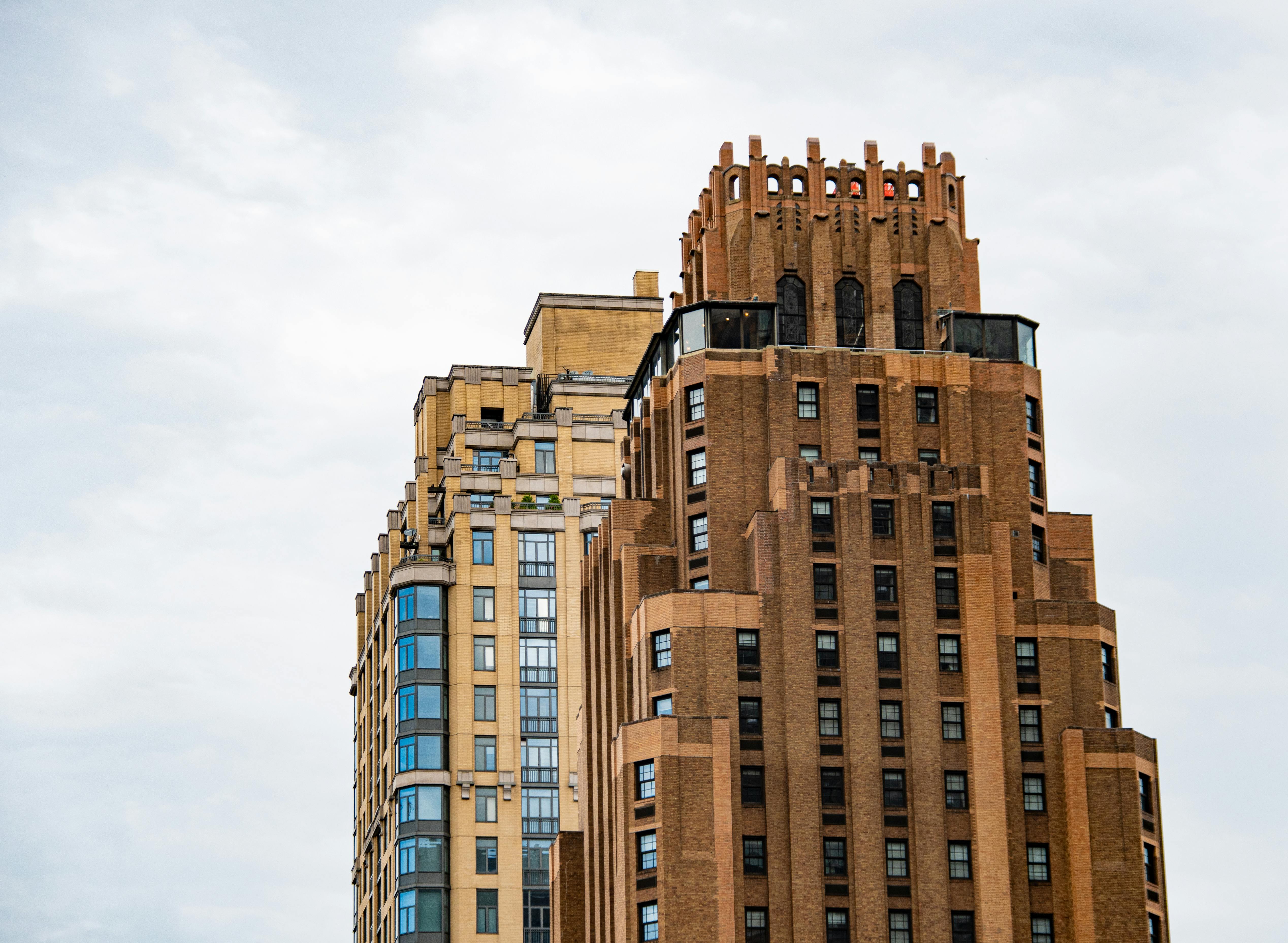 Brown Brick Building with Glass Windows · Free Stock Photo