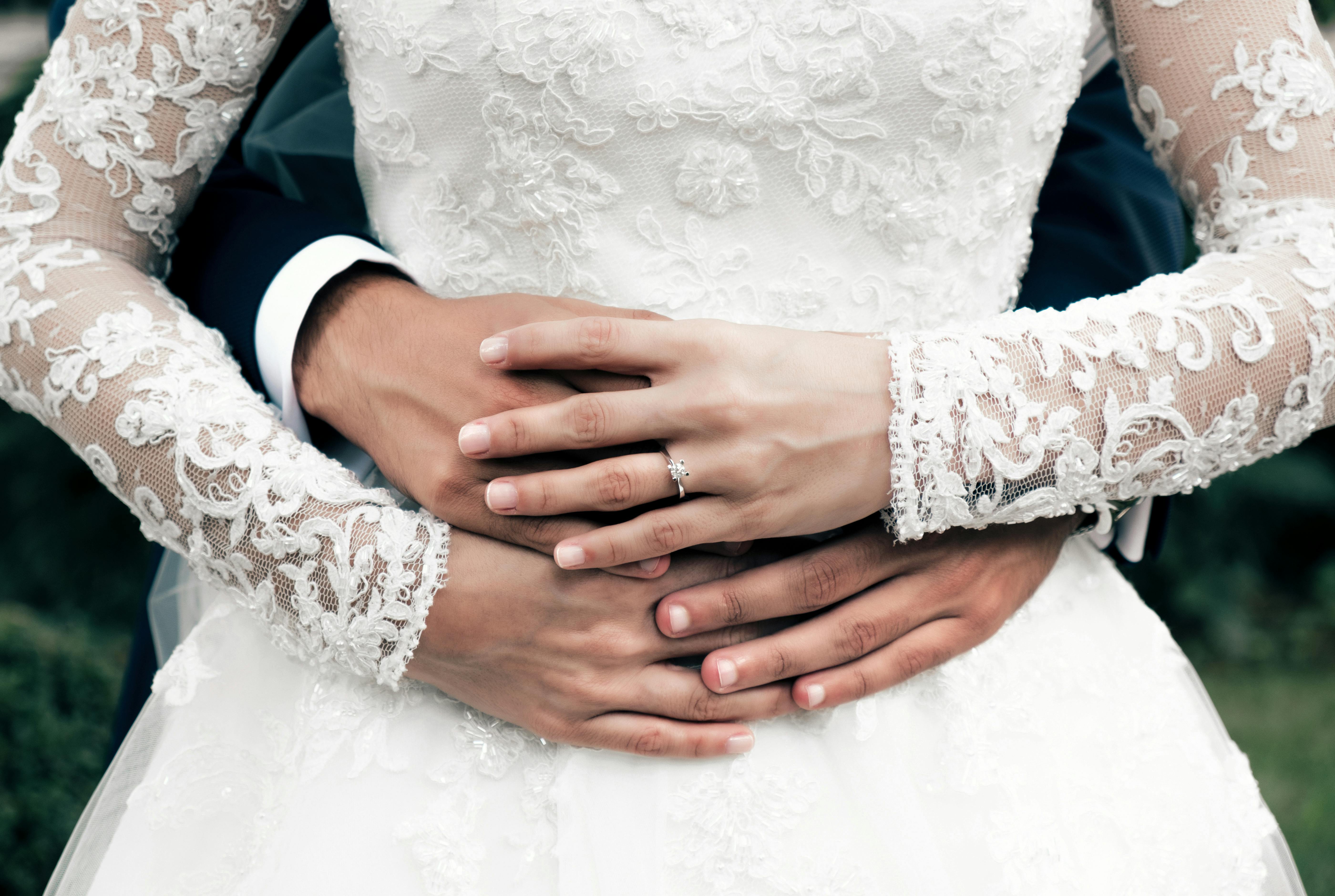 Woman Wearing a Wedding Dress and an Engagement Ring · Free Stock Photo