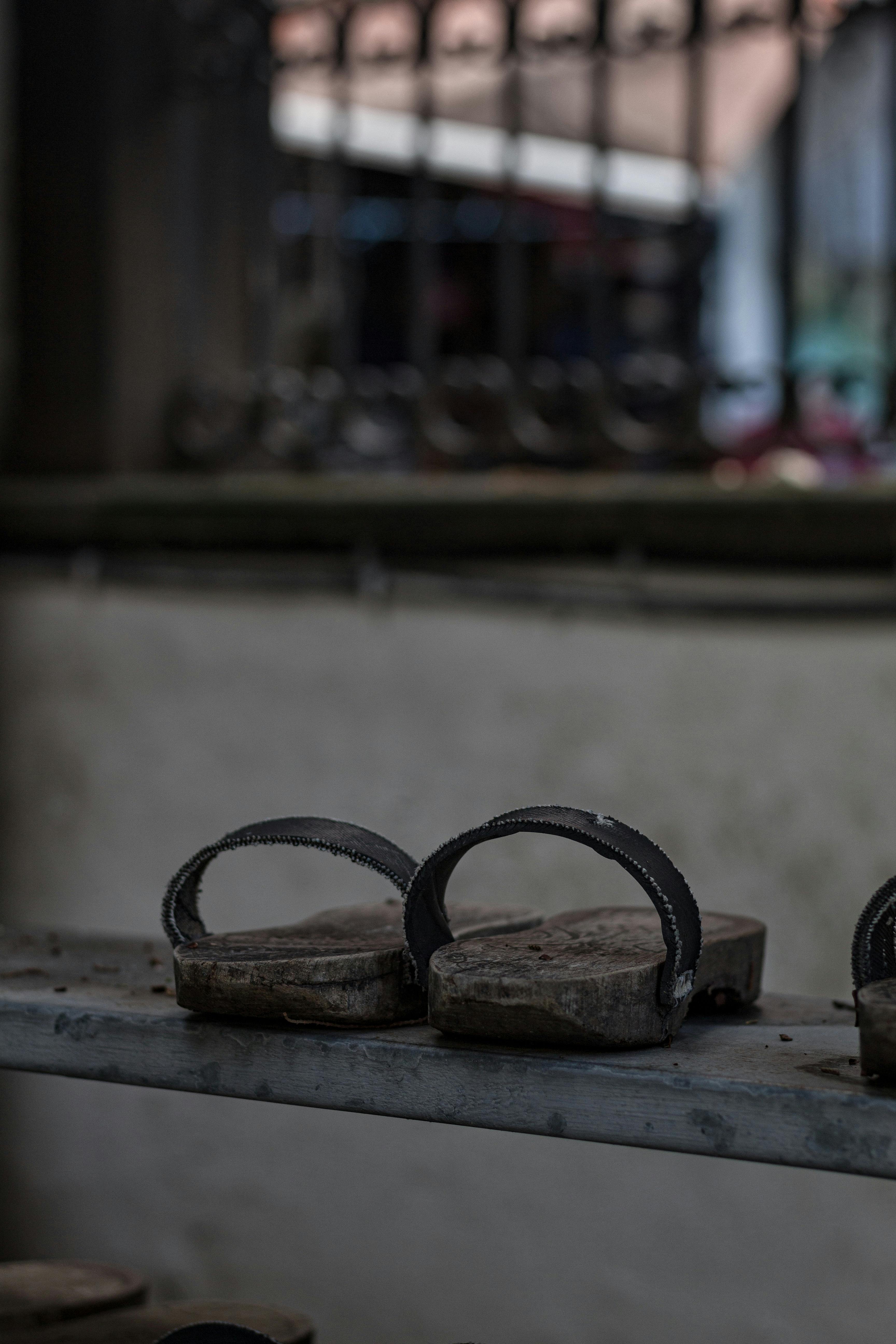 Traditional Asian flip flops with wooden sole · Free Stock Photo