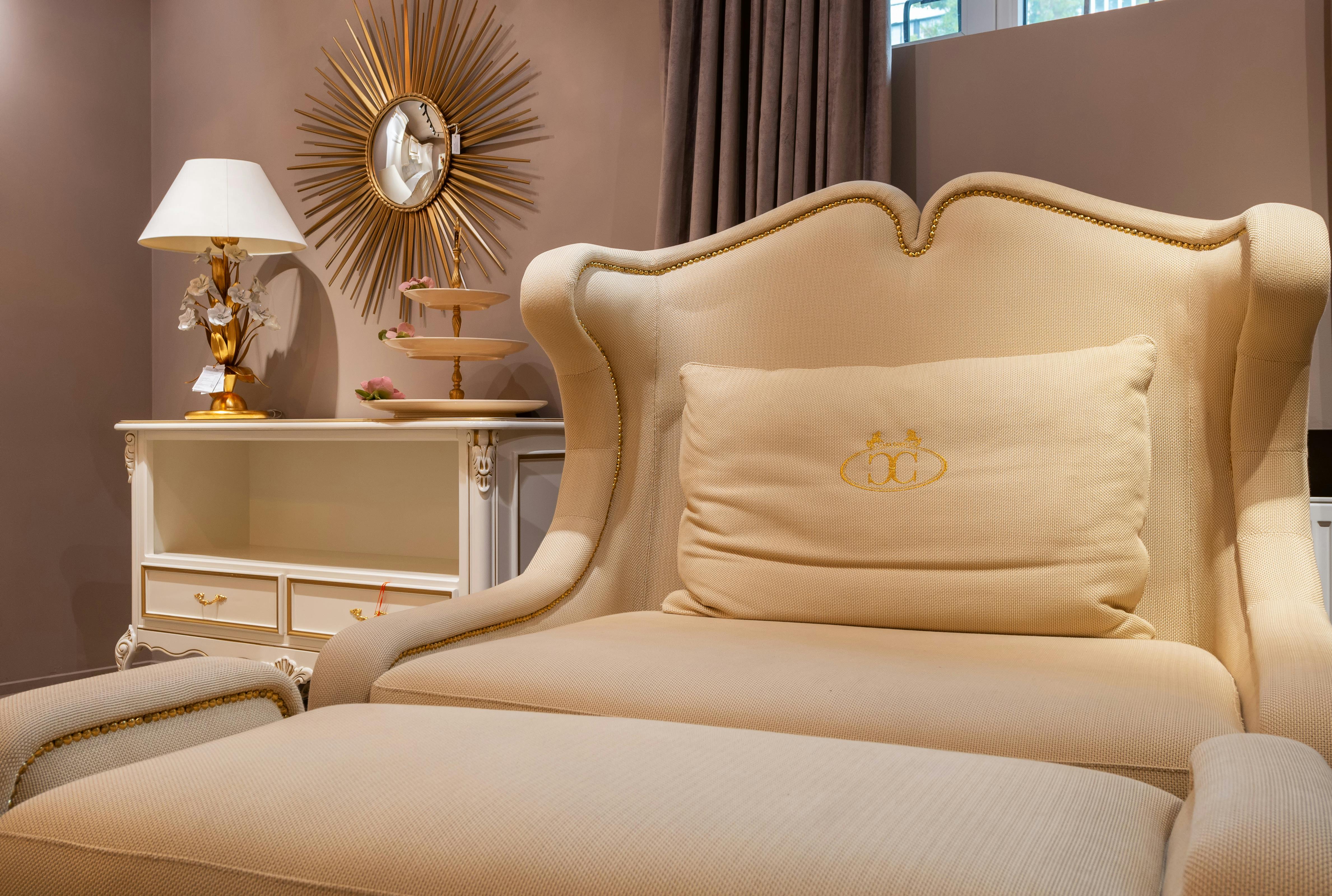 Elegant ottoman bench placed under window in elegant room · Free Stock ...