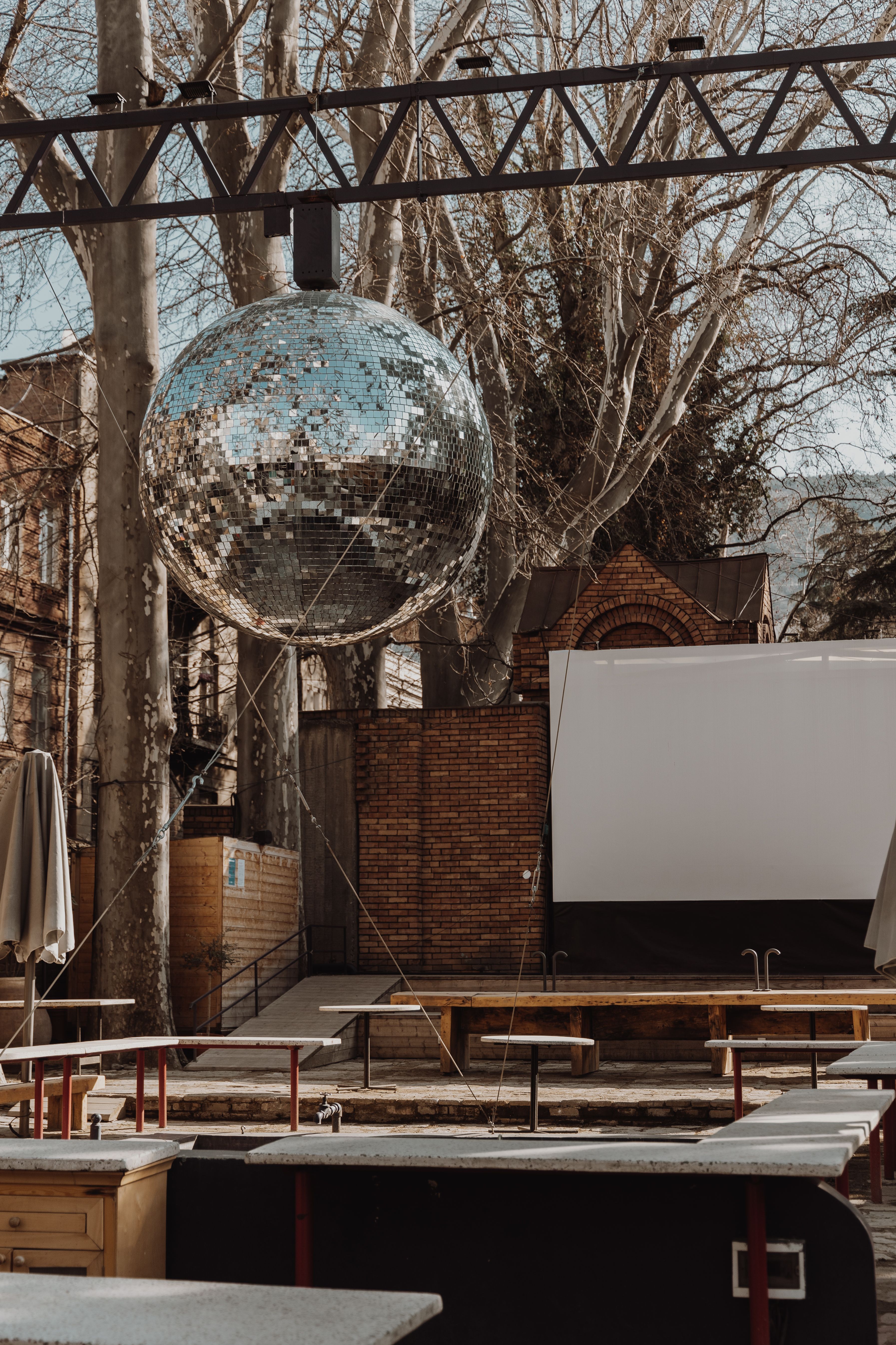Disco Ball in Outdoor Cafe Seating · Free Stock Photo
