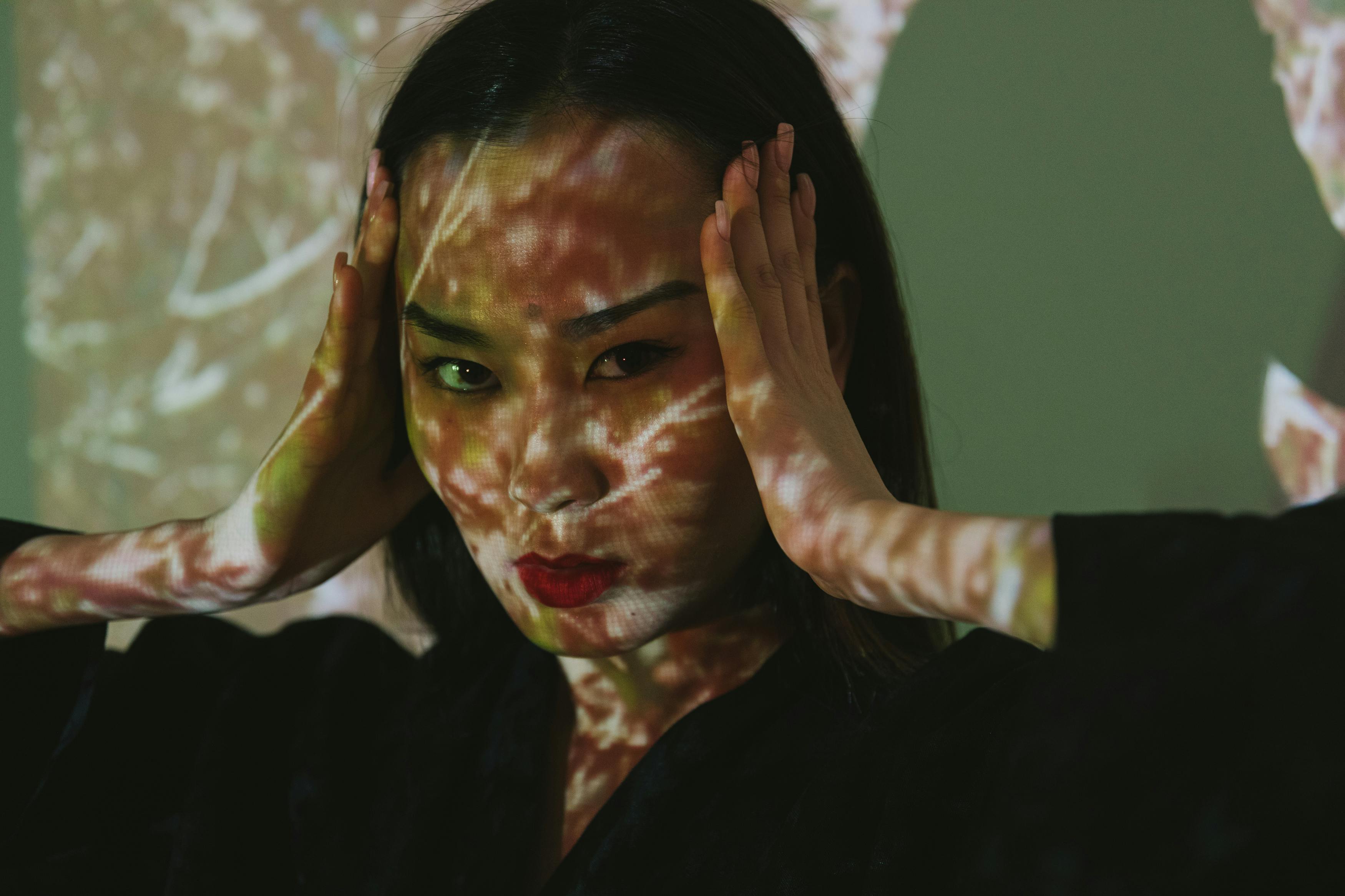 A Woman Screaming with Red Powder on Her Face · Free Stock Photo