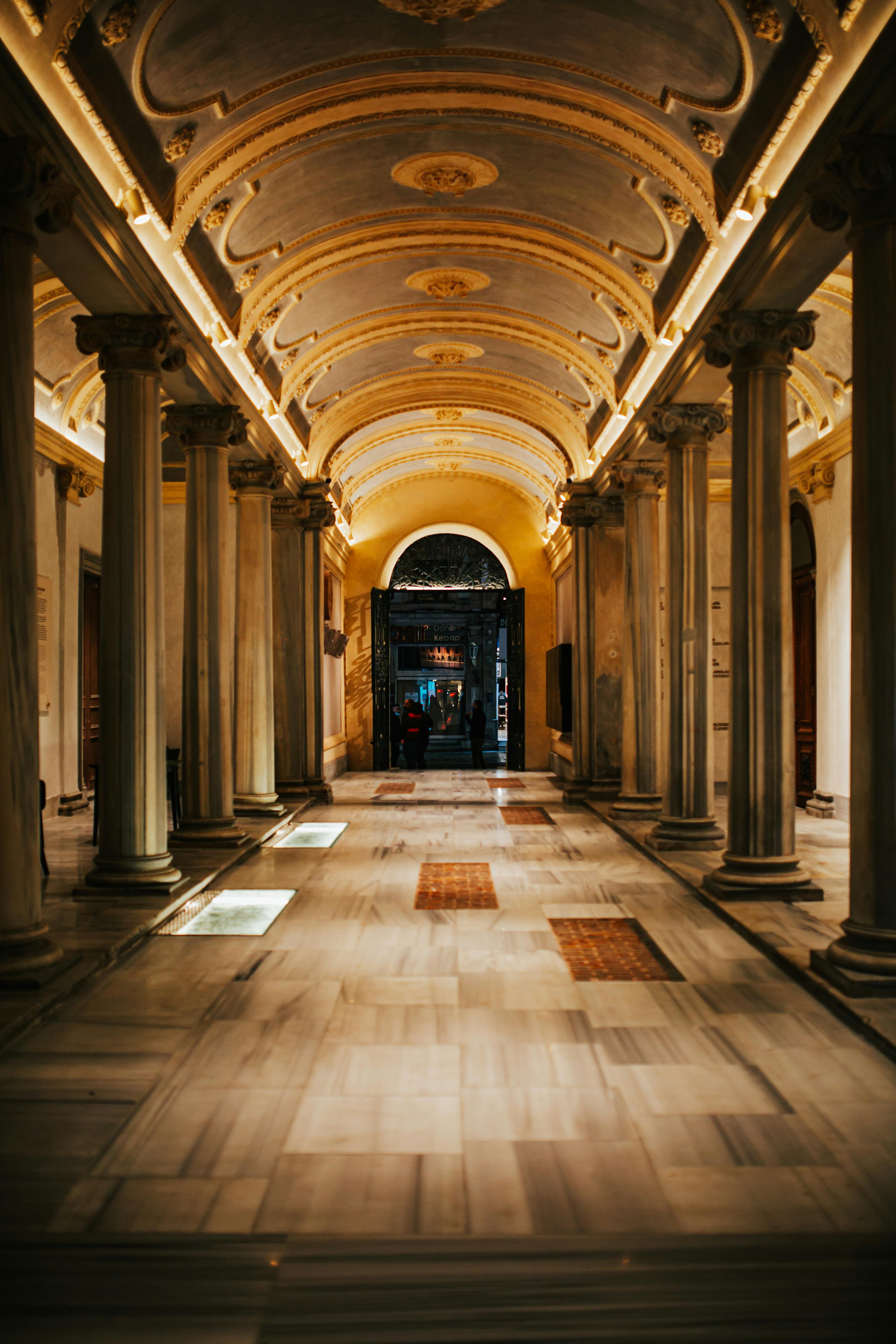 Shabby hallway with columns in aged building · Free Stock Photo